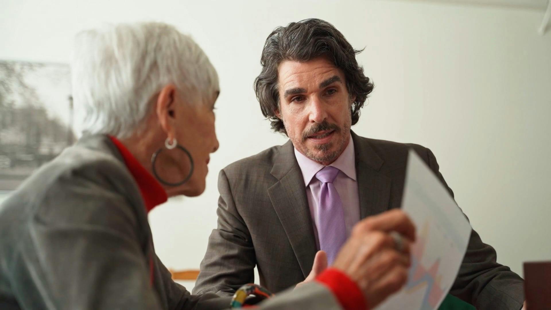 Realtor Talking to His Client Using Digital Tablet · Free Stock Video