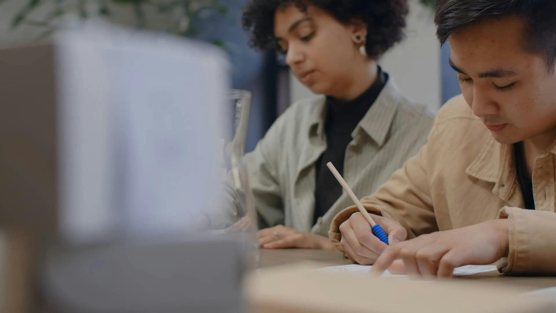 People Writing at Work · Free Stock Video