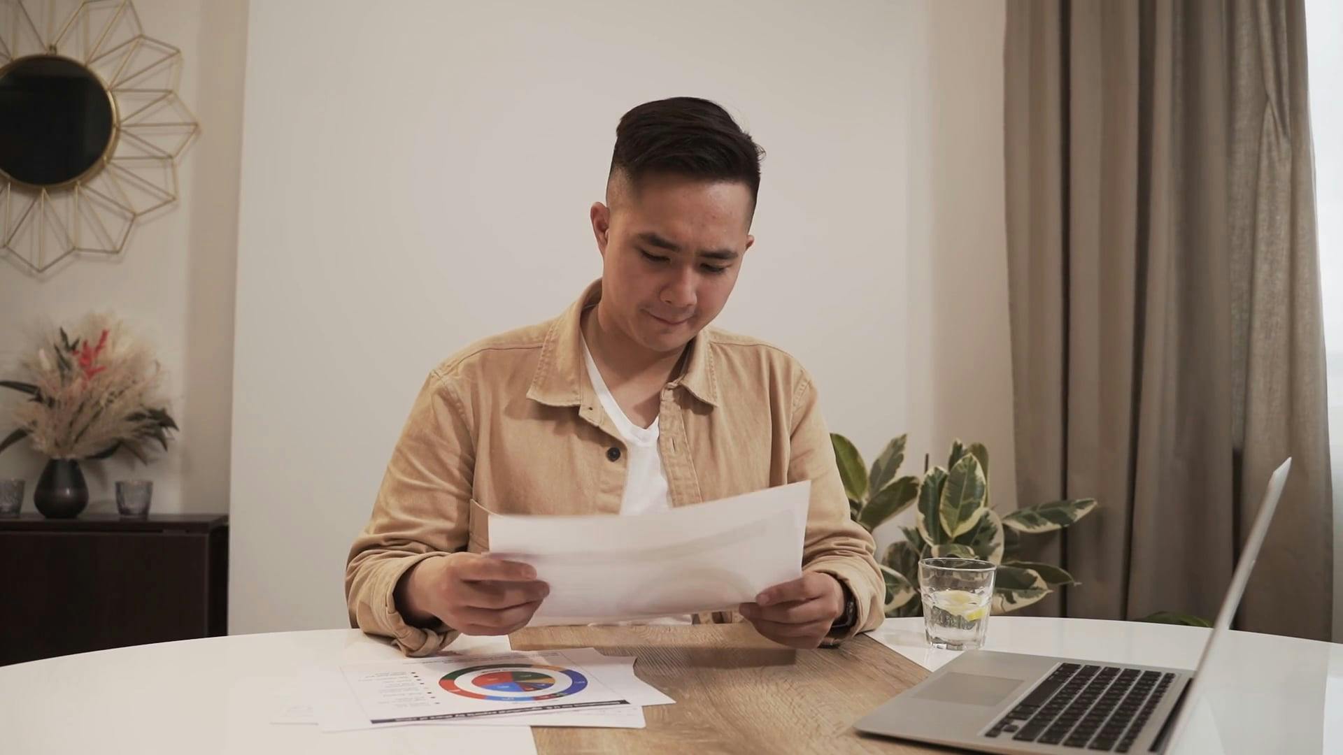 A Man Reading the Papers While Sitting Free Stock Video Footage ...