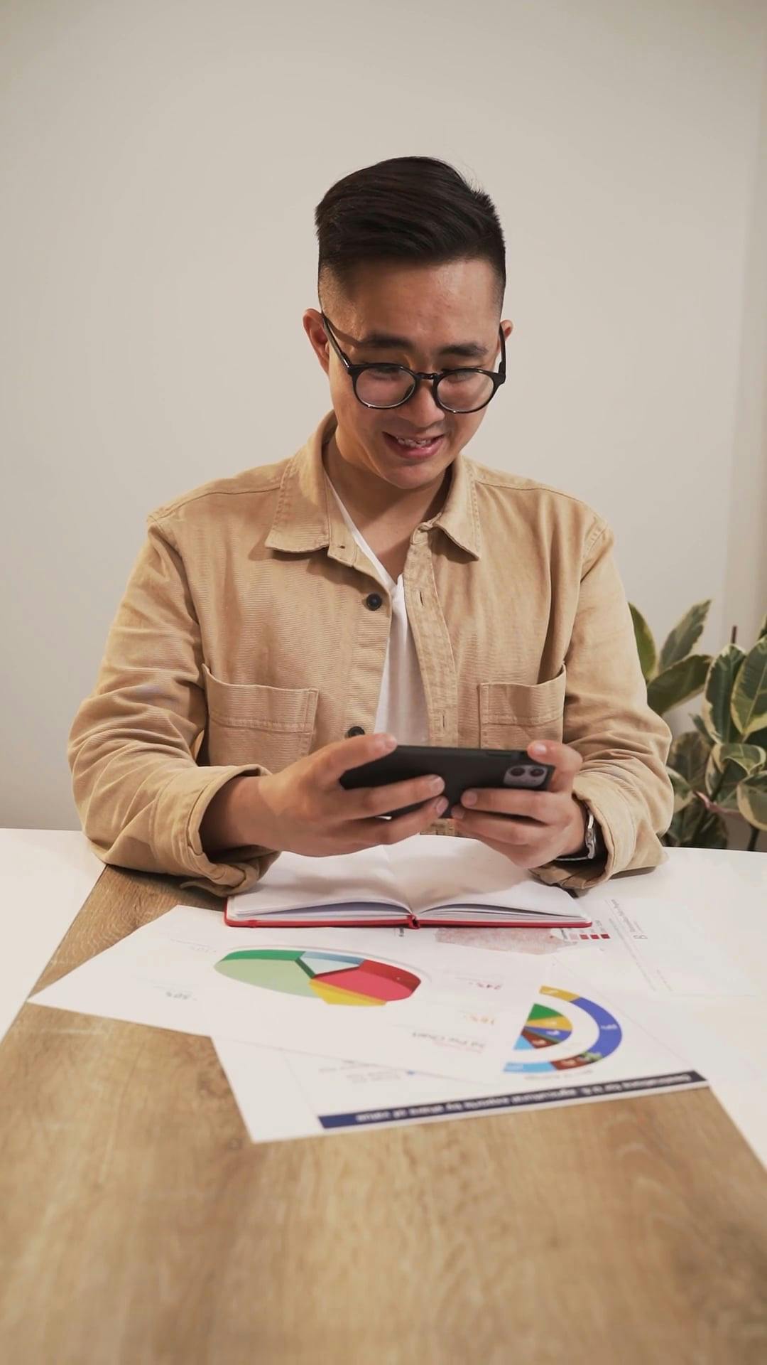 Man Playing On a Smartphone · Free Stock Video