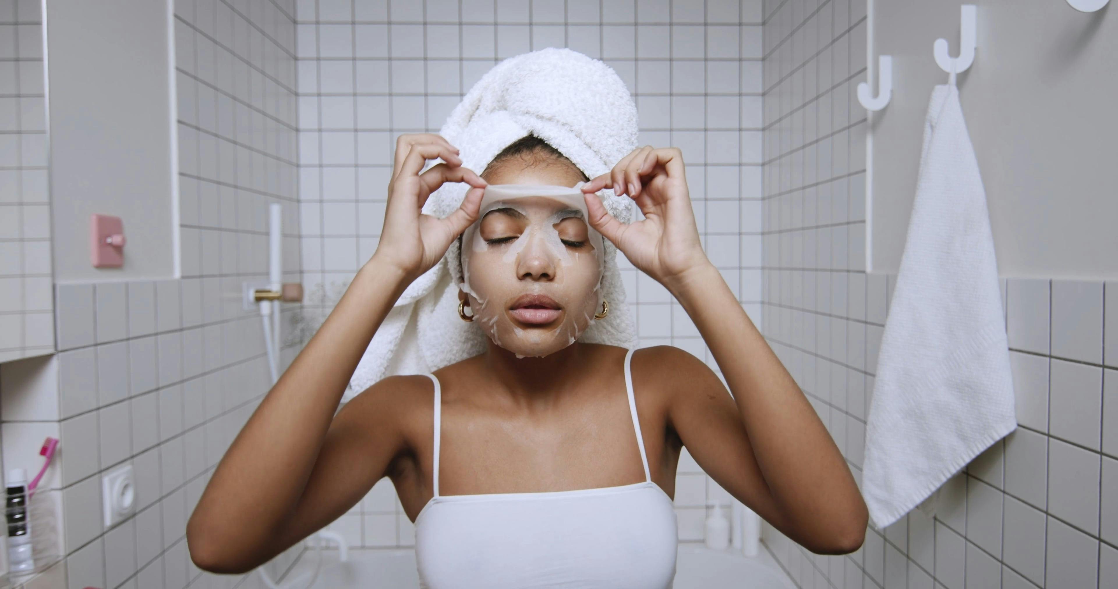 Video of Woman Removing Face Mask on her Face Free Stock Video Footage ...