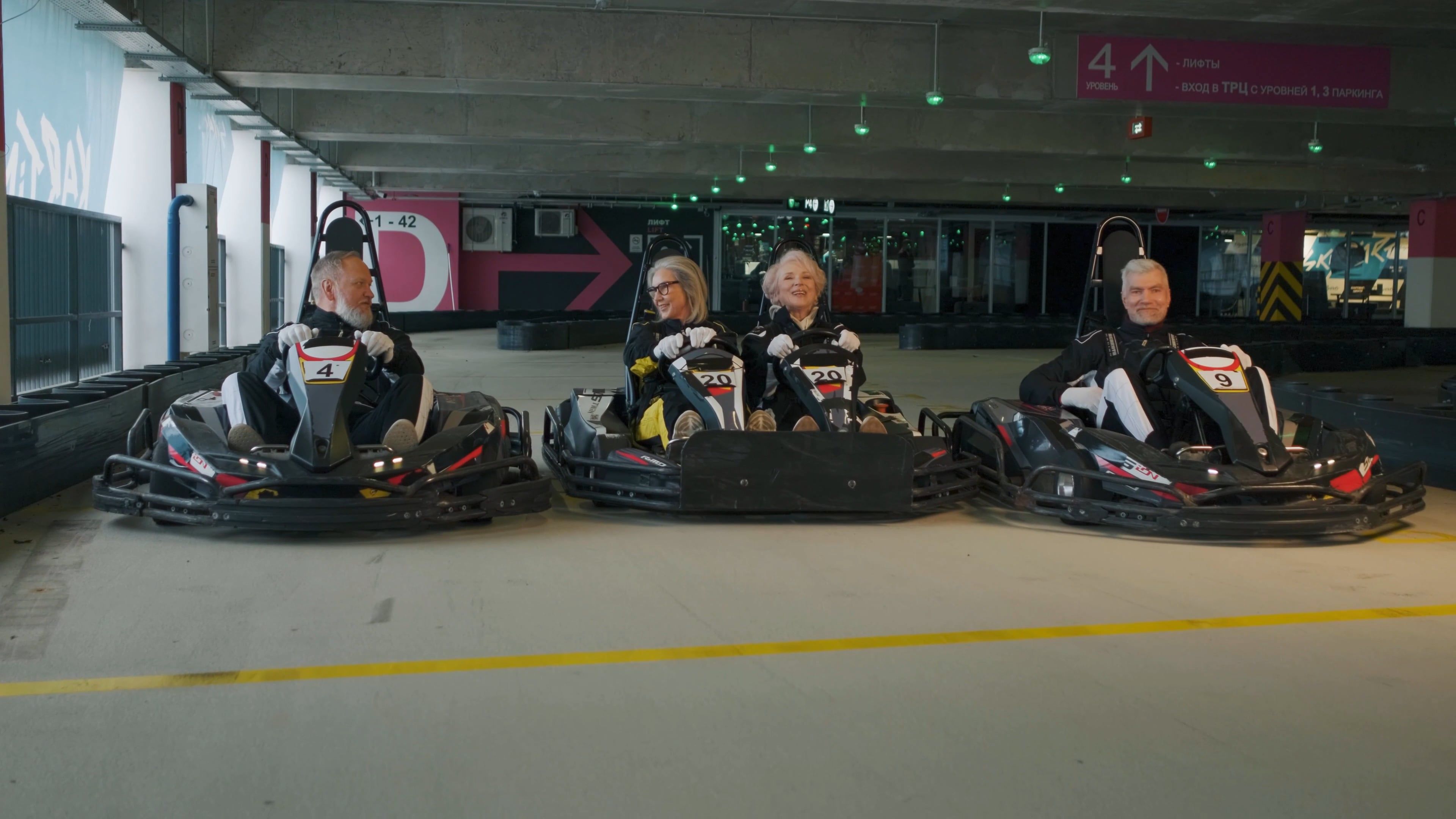 Elderly People Sitting inside Go Karts Doing Hand Gestures · Free Stock ...
