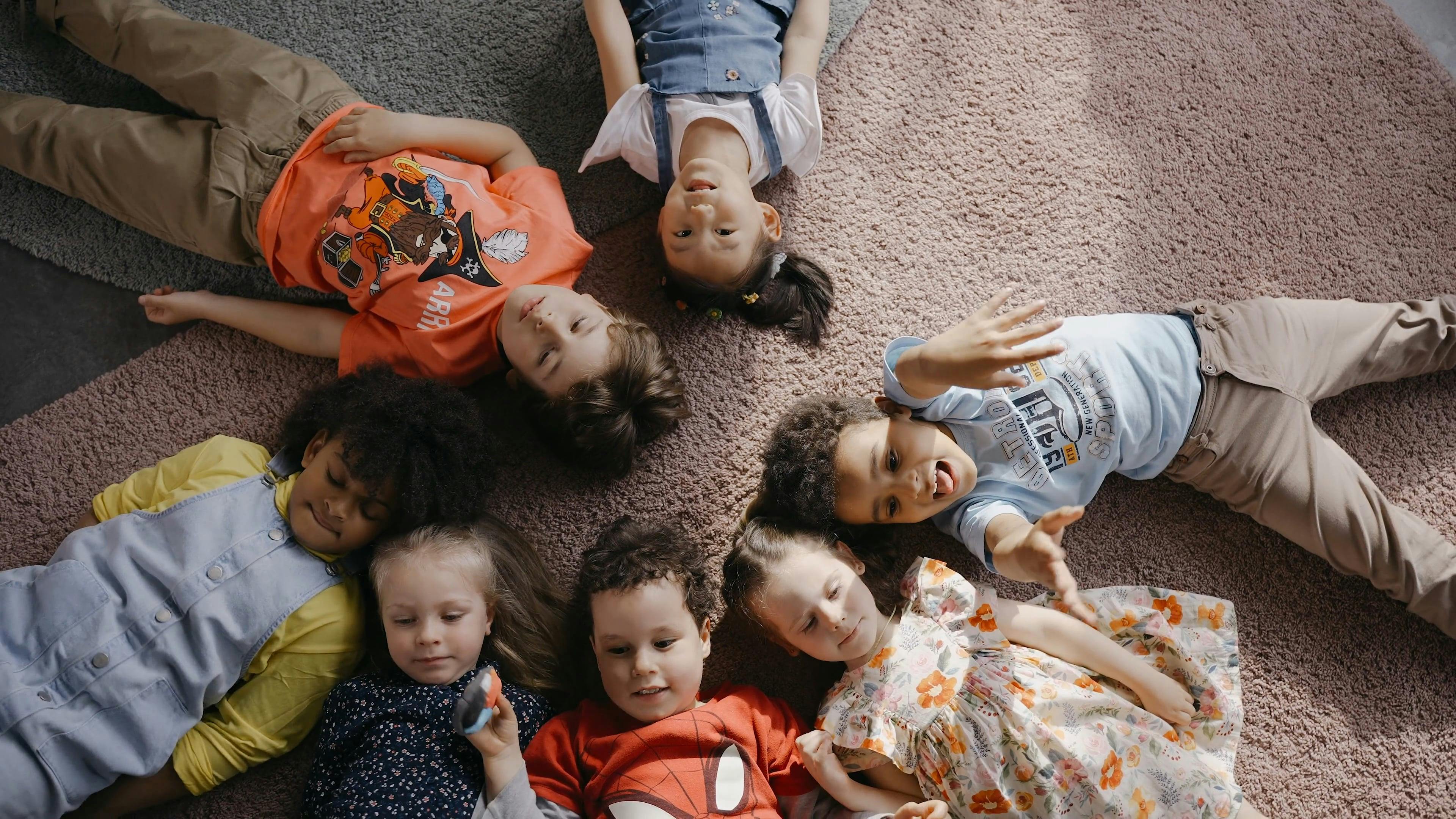 Children Lying Down on the Floor · Free Stock Video