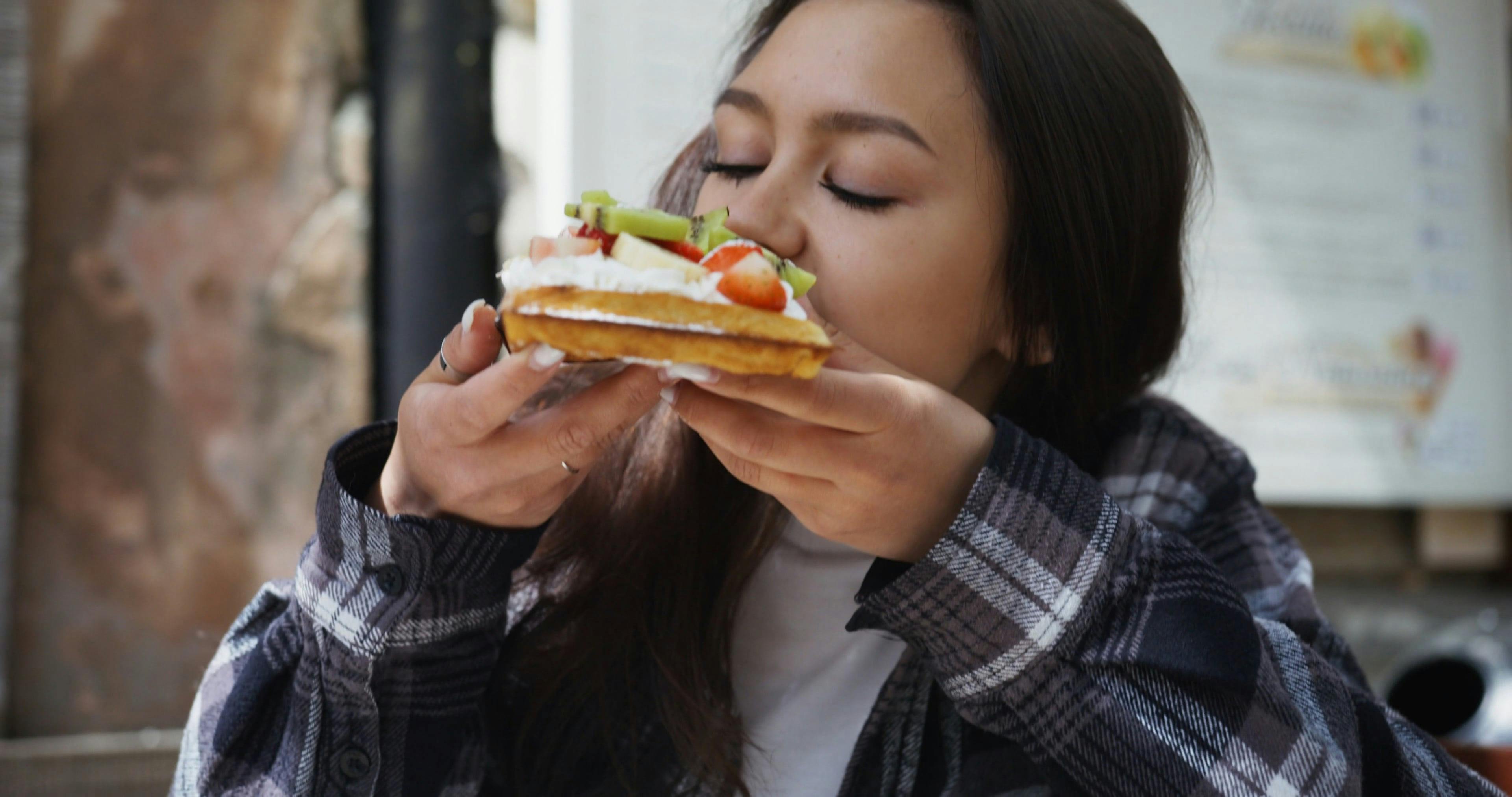 Woman Eating a Belgian Waffle · Free Stock Video