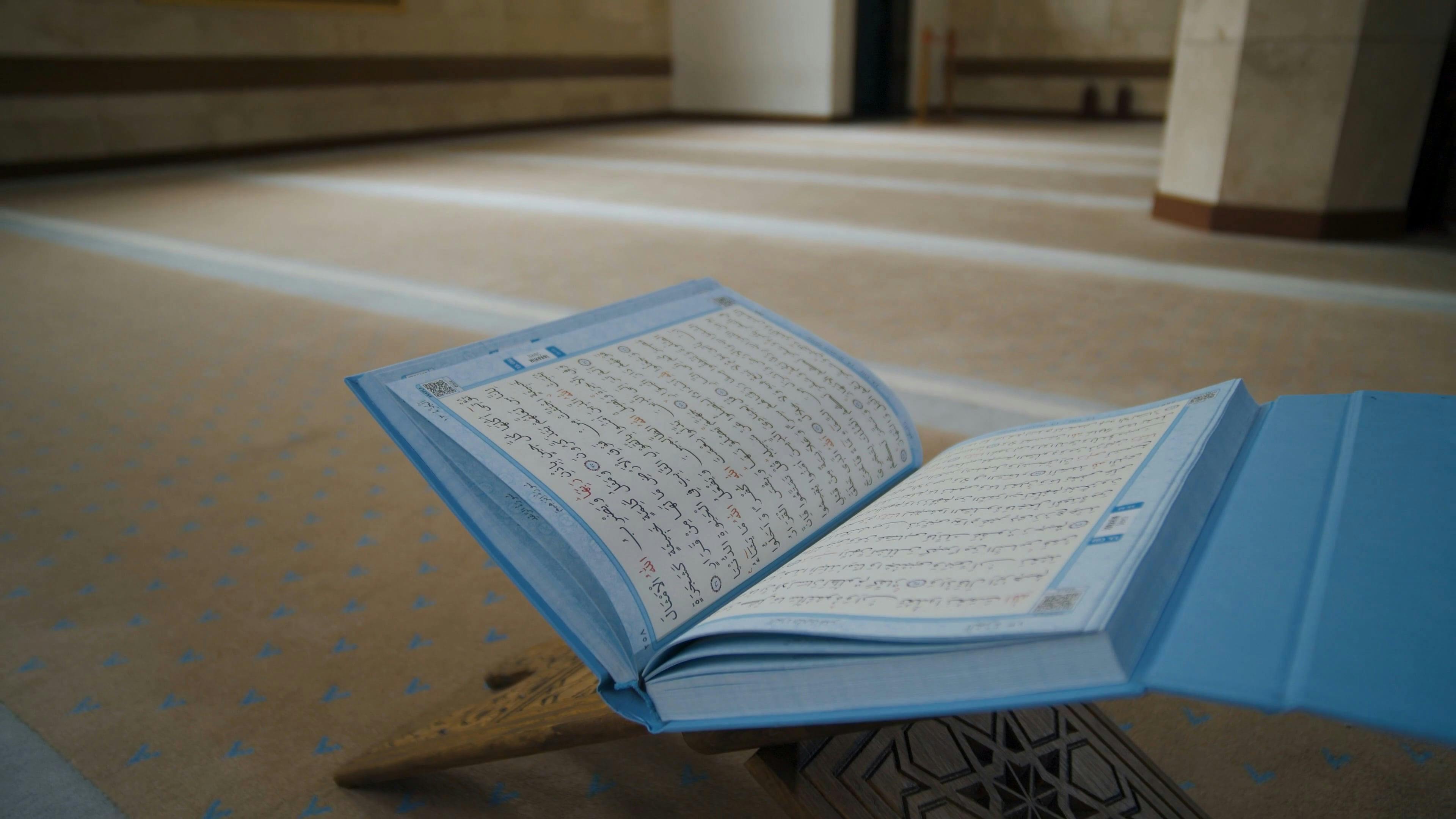 An Opened Book of Quran · Free Stock Video