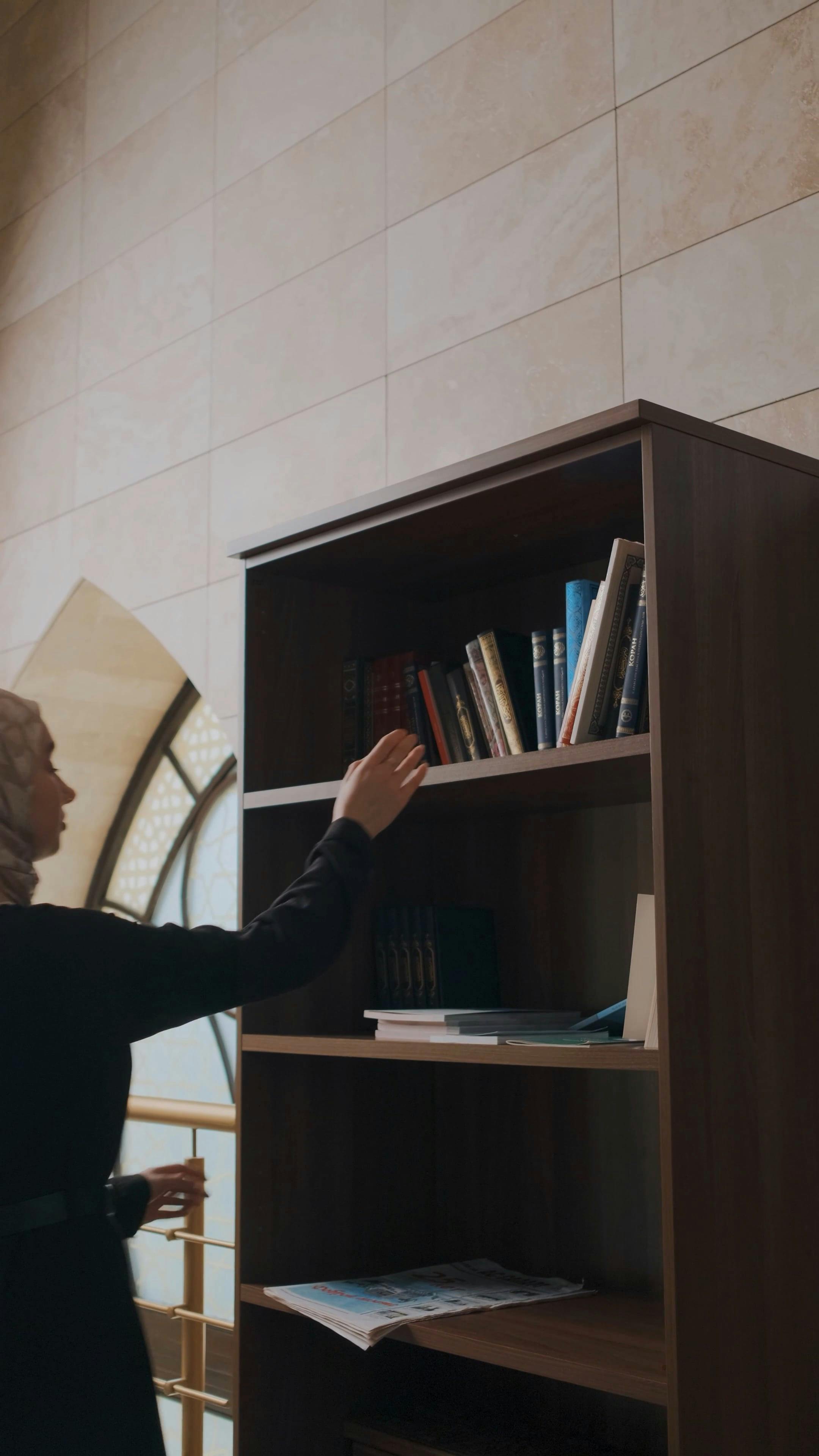 A Woman Getting a Book Free Stock Video Footage, Royalty-Free 4K & HD ...