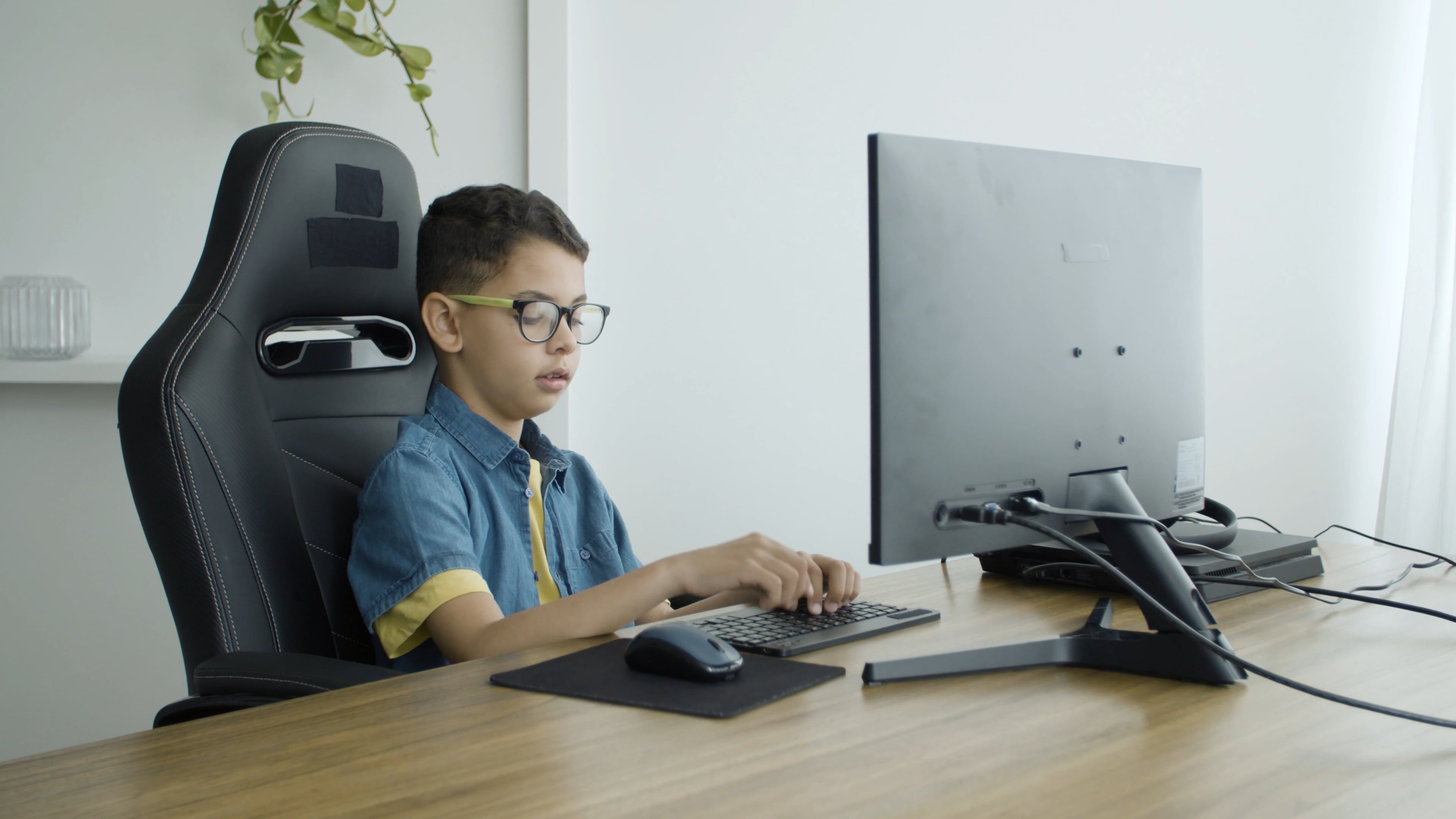 A Boy Playing Computer Games · Free Stock Video