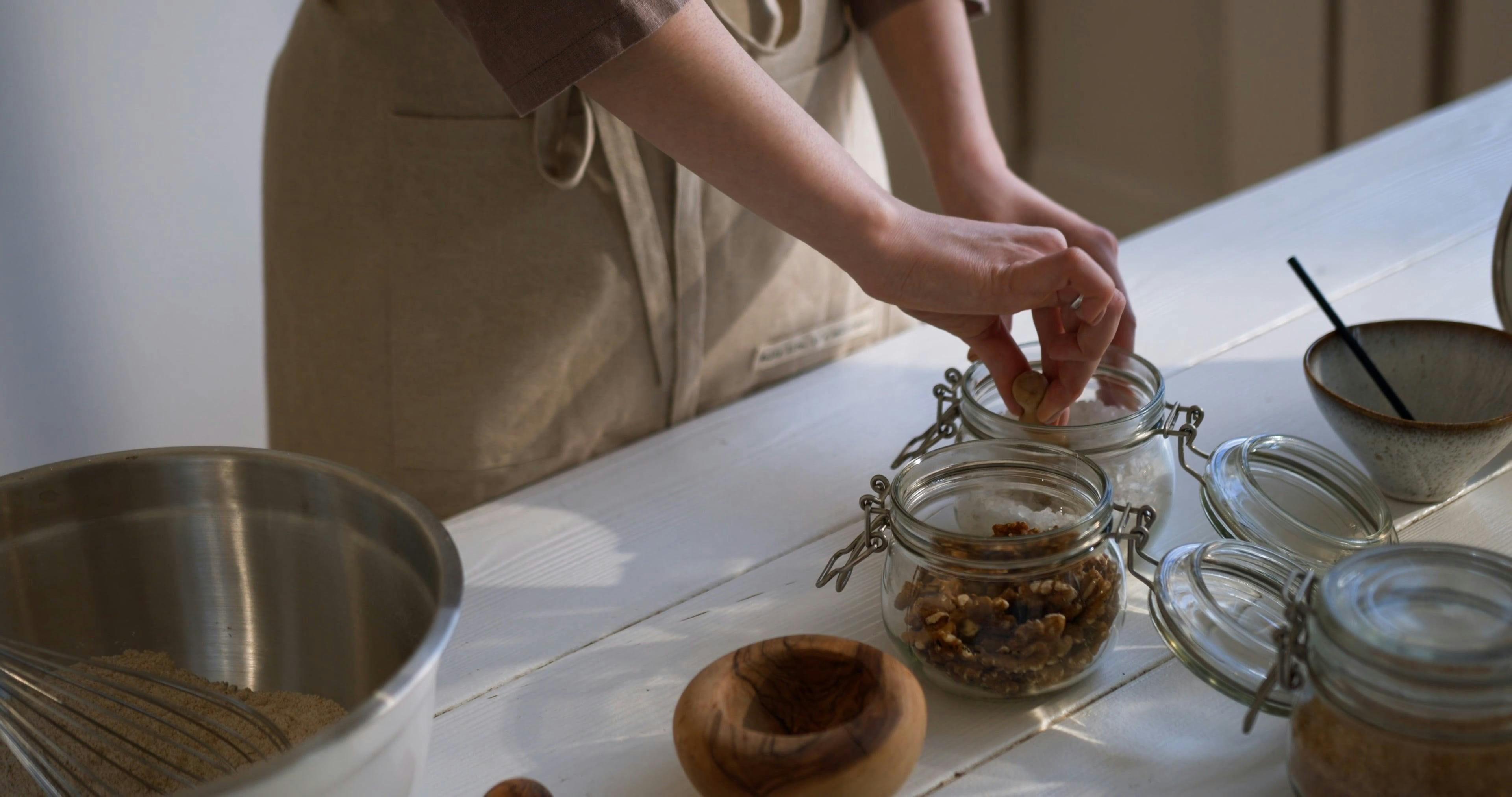 A Person Crushing Nuts Using a Mortar and Pestle Free Stock Video ...
