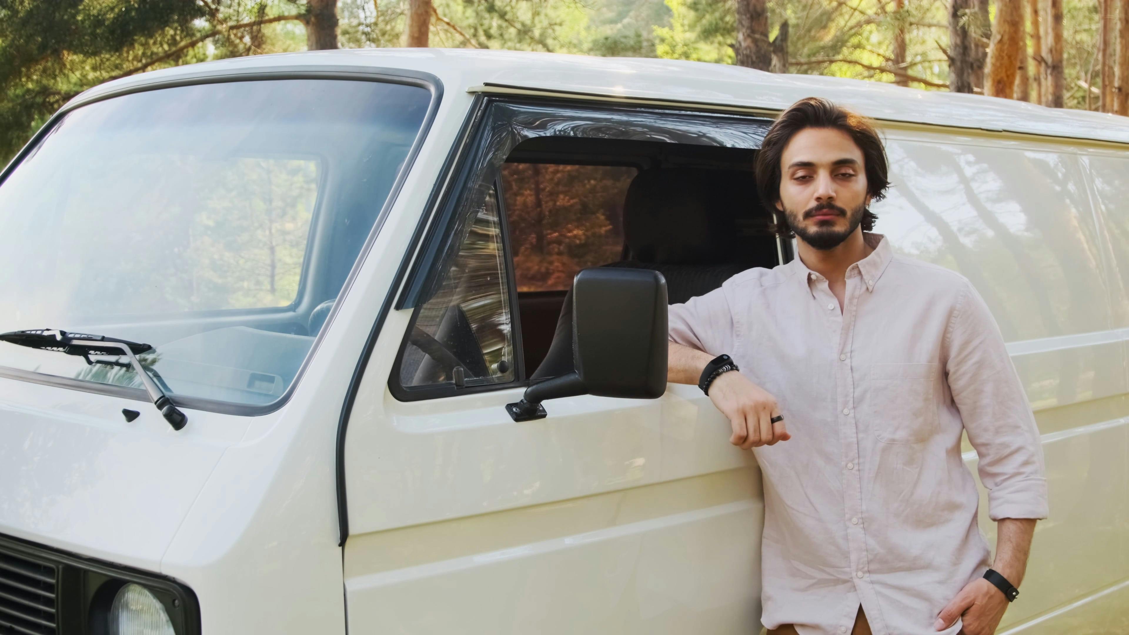 A Man Leaning on Minivan Free Stock Video Footage, Royalty-Free 4K & HD ...