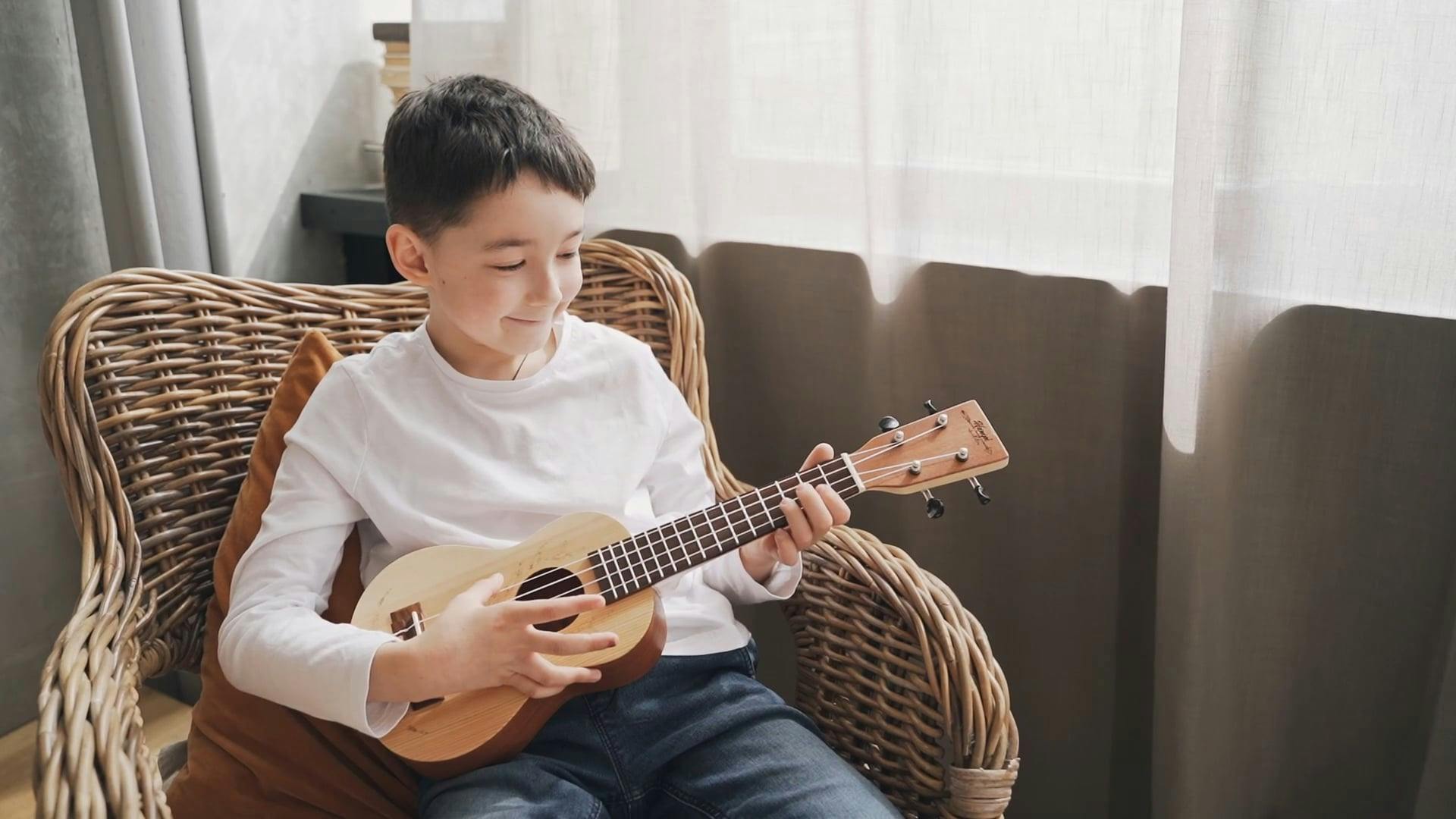 A Boy Playing Ukulele Free Stock Video Footage, Royalty-Free 4K & HD ...