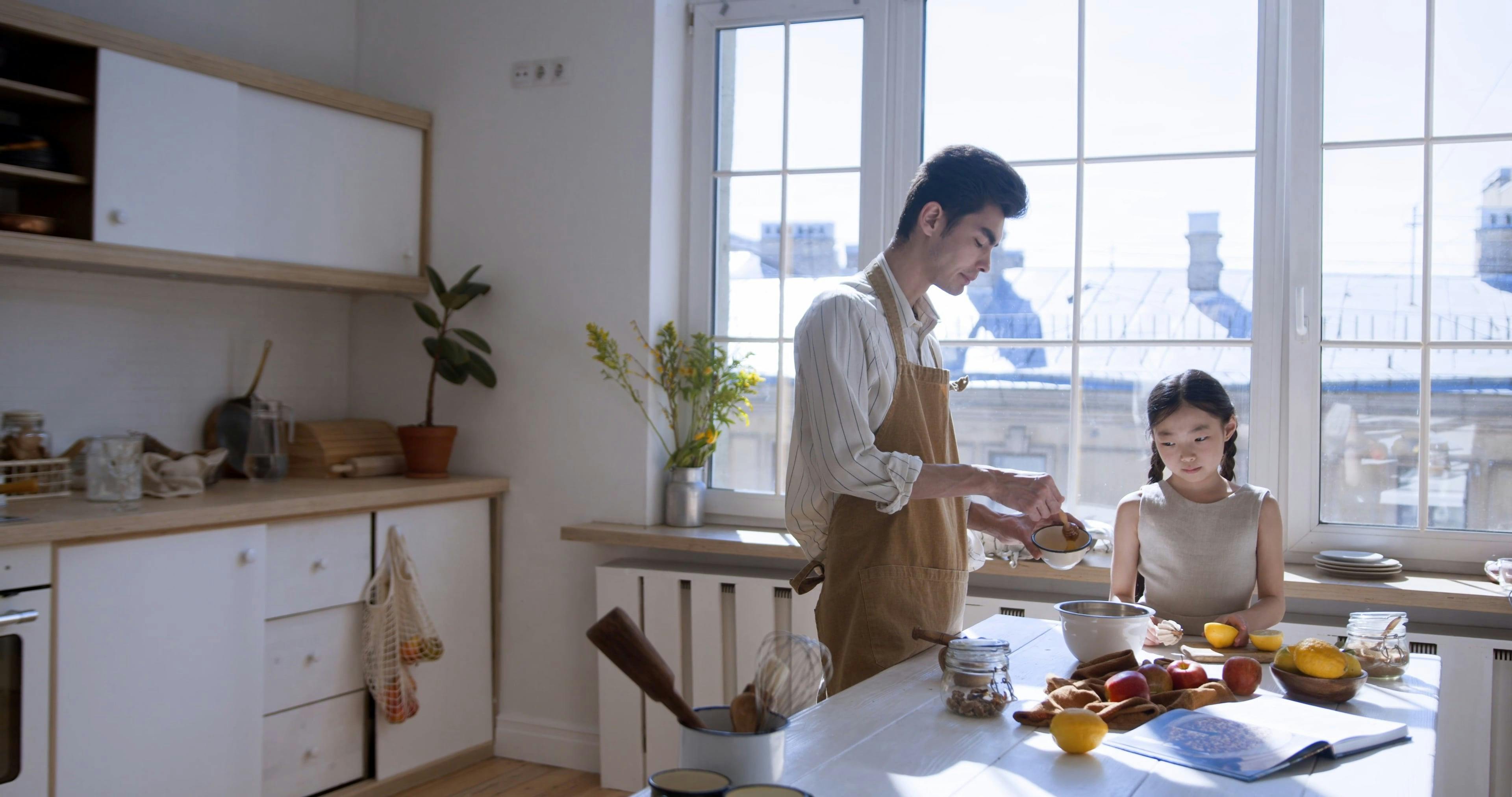 Father and Daughter Cooking · Free Stock Video