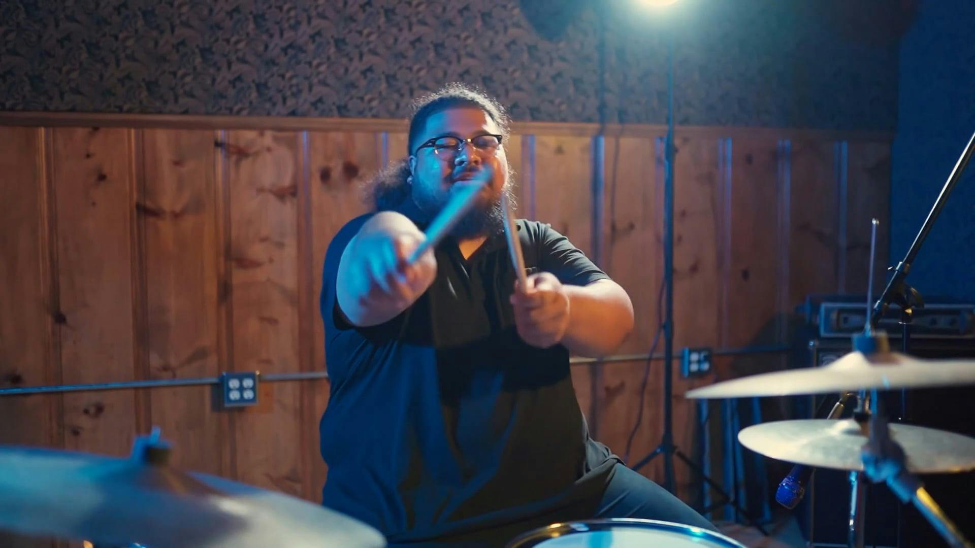 A Drummer Posing While Holding Drumsticks Free Stock Video Footage ...