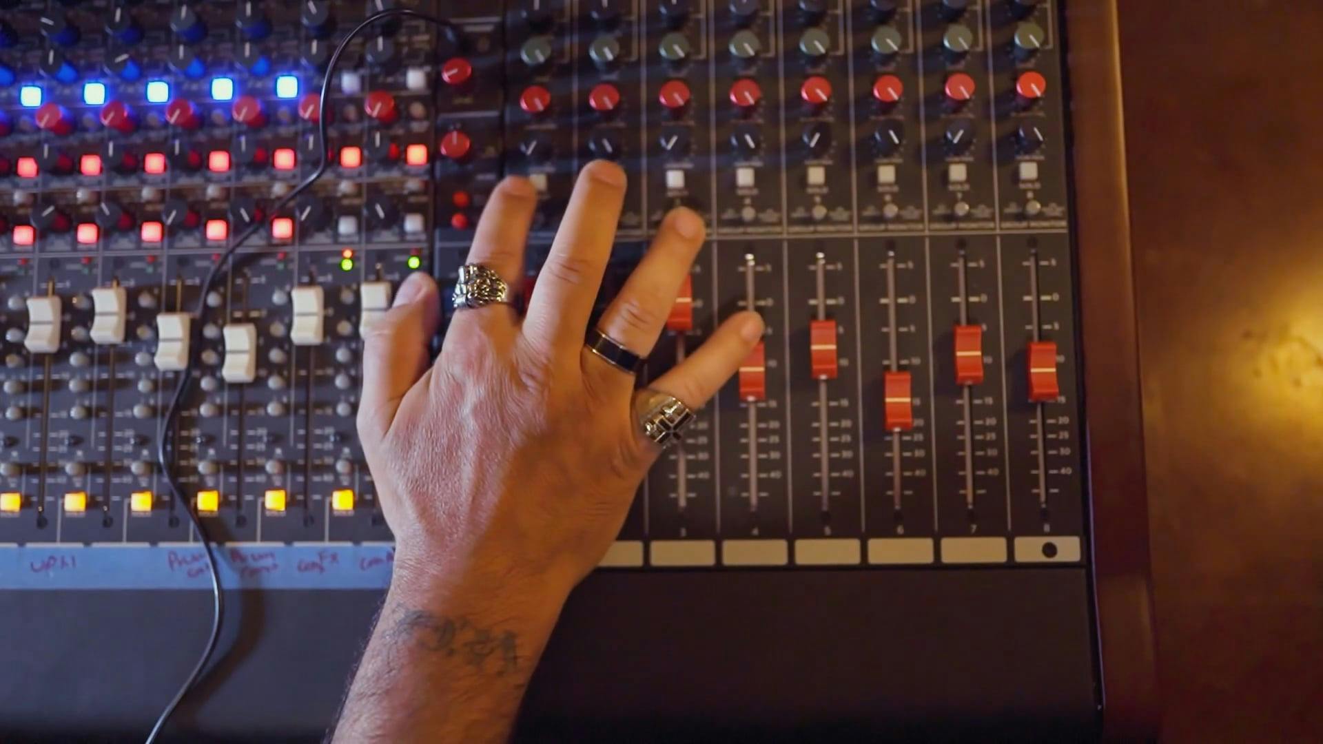 A Music Producer Operating the Audio Mixer Free Stock Video Footage ...