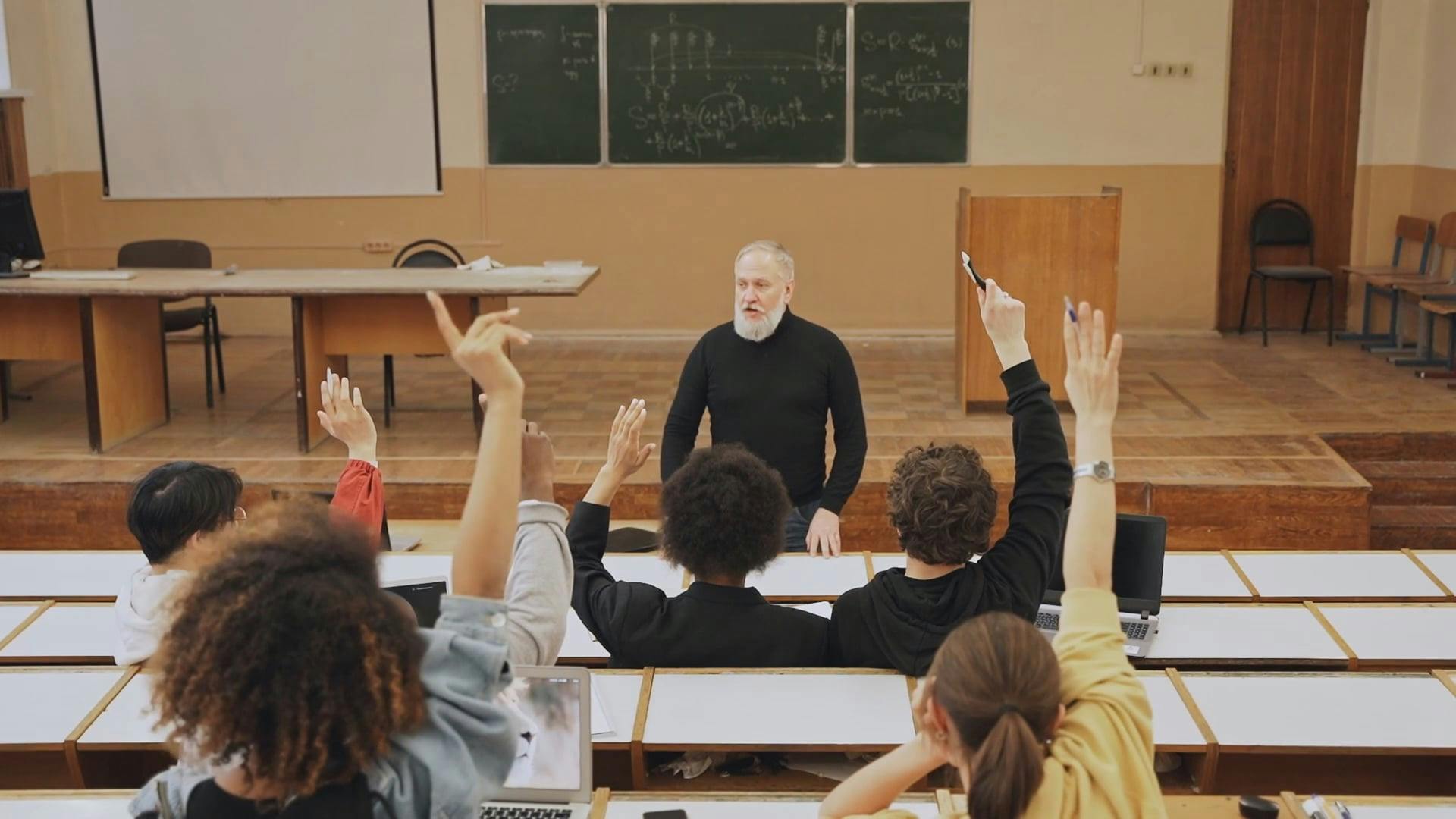 Students Raising Hands in Class · Free Stock Video