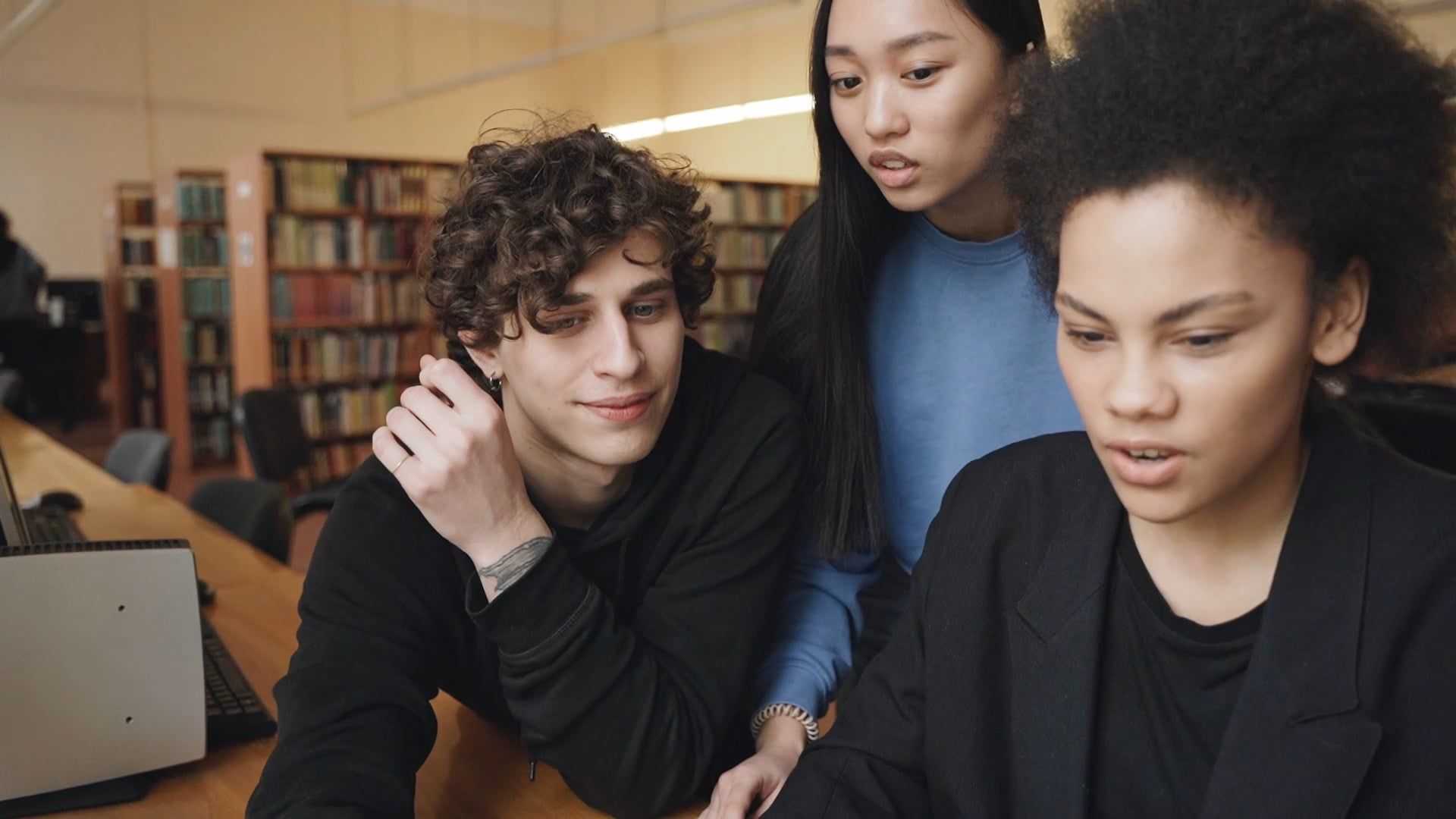 Students Doing Research In The Library · Free Stock Video