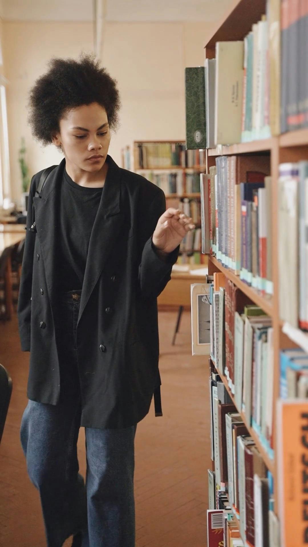 Female Student Finding a Book in the Library Free Stock Video Footage ...
