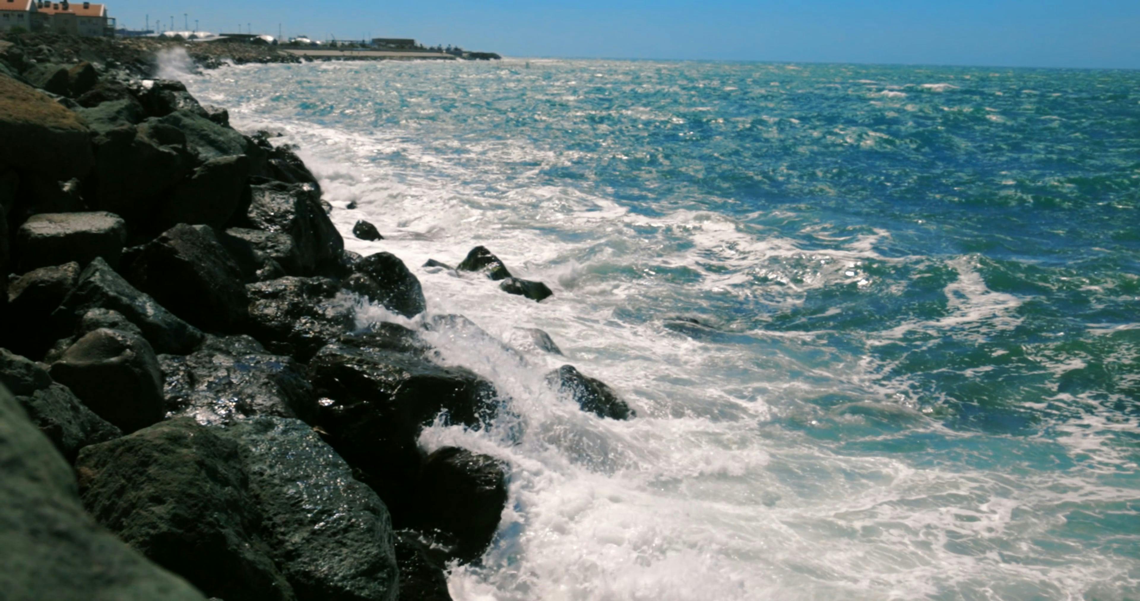 Strong Waves Crashing The Rocks Formation In The Shore · Free Stock Video