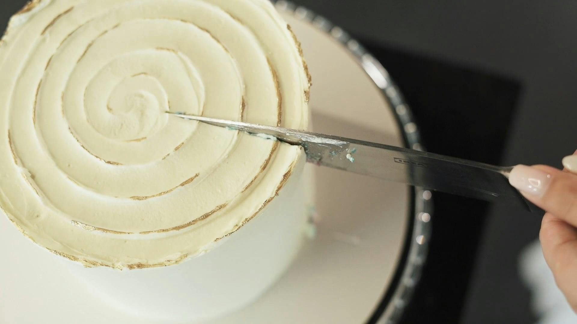 A Person Slicing a White Cake · Free Stock Video