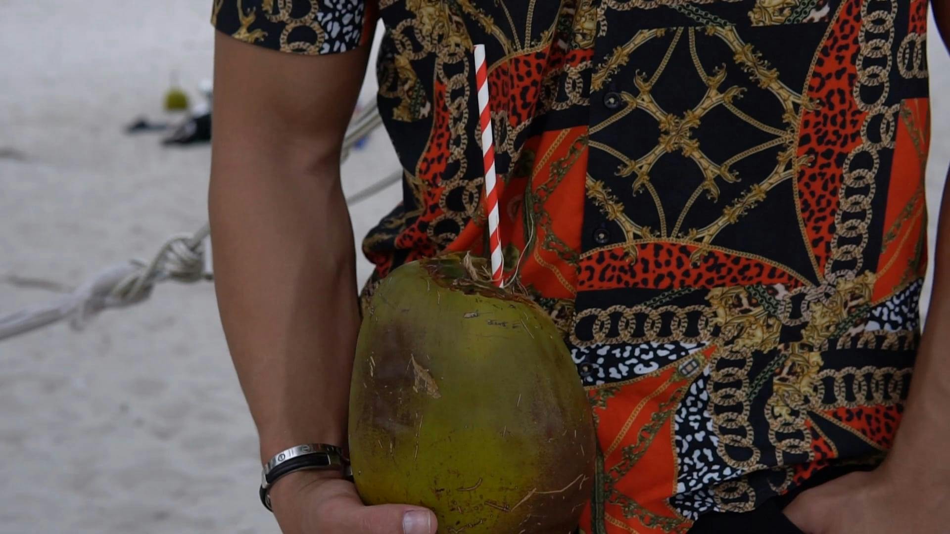 Man Holding A Coconut · Free Stock Video