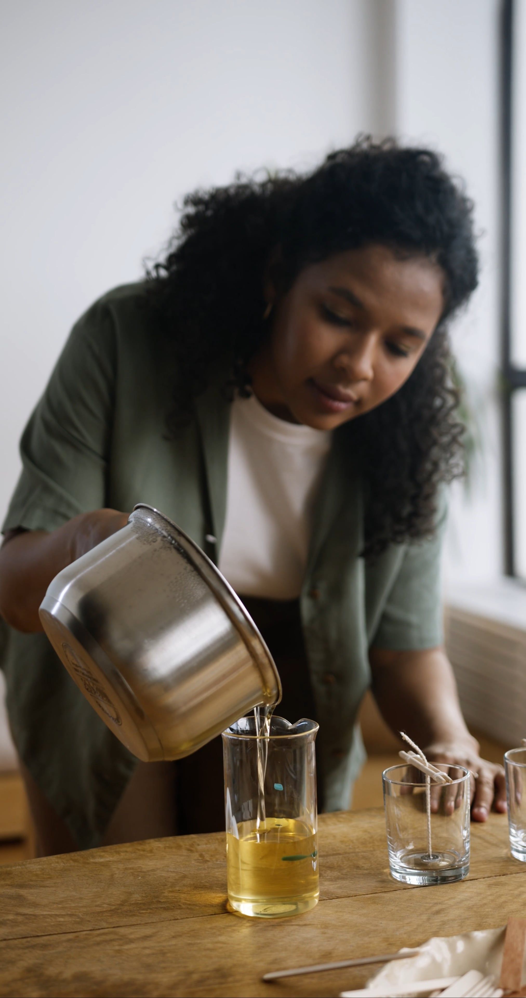 A Woman Pouring Liquid on a Beaker Free Stock Video Footage, Royalty ...
