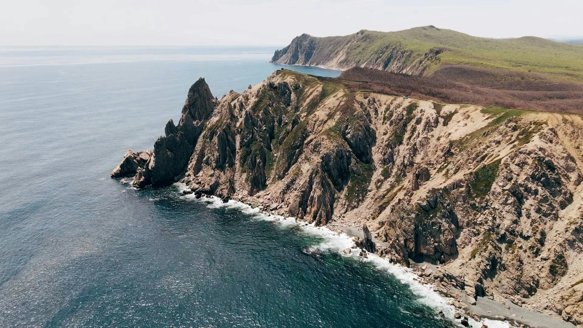 Aerial View of a Cliff and the Sea · Free Stock Video