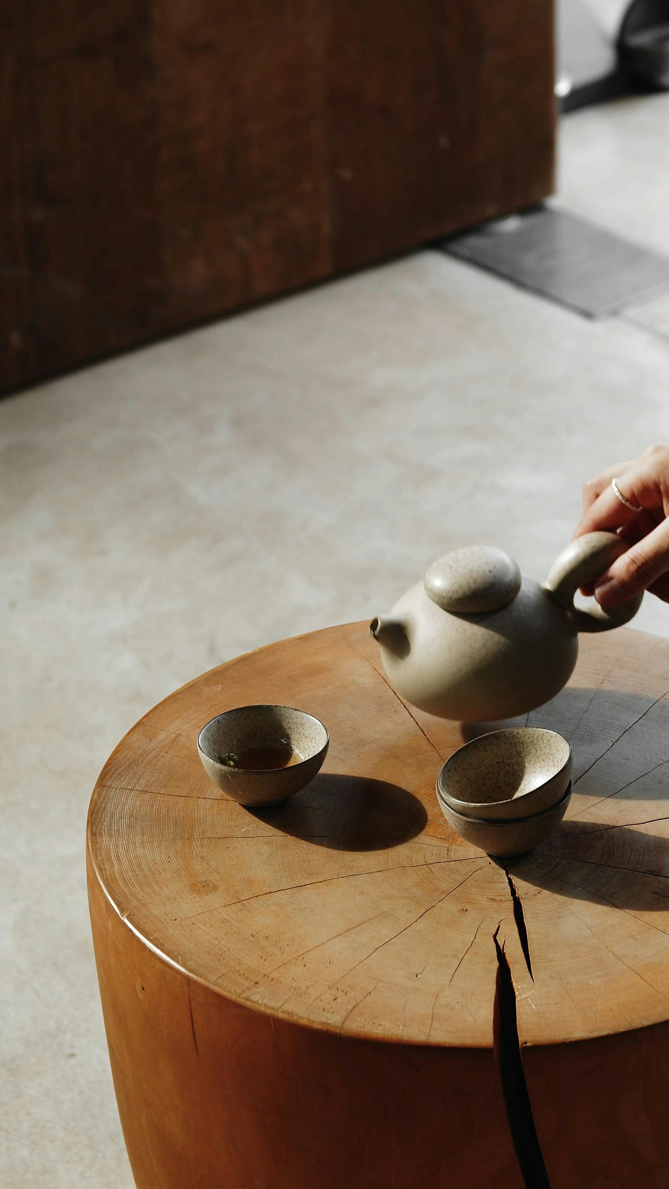 Pouring Tea On Teacup · Free Stock Video