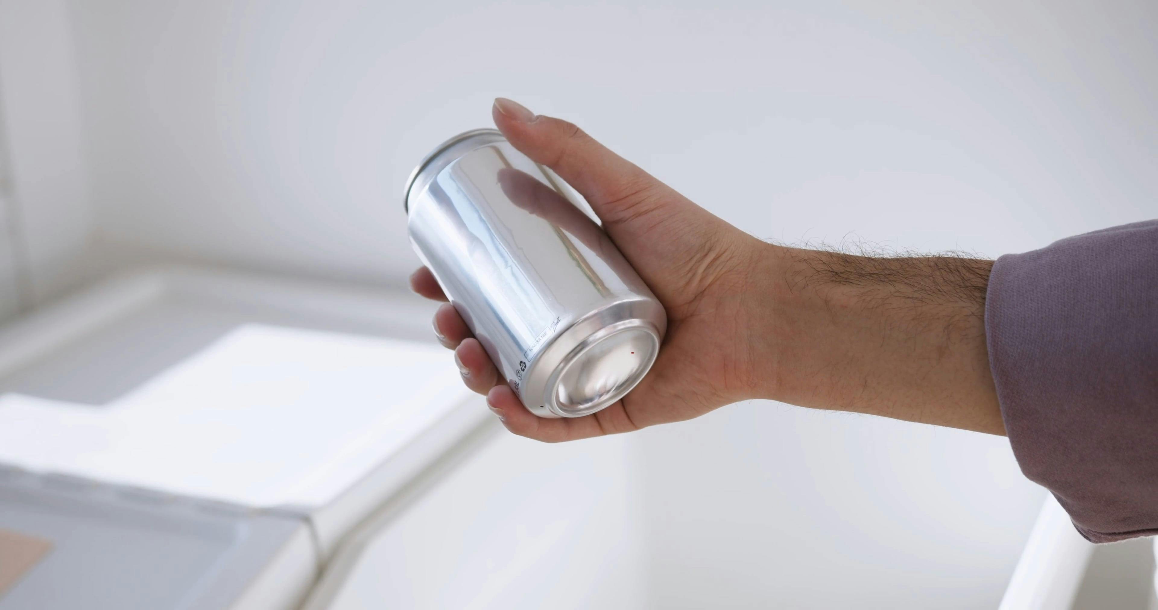 Hand Smashing Can and Putting on a Container Free Stock Video Footage ...