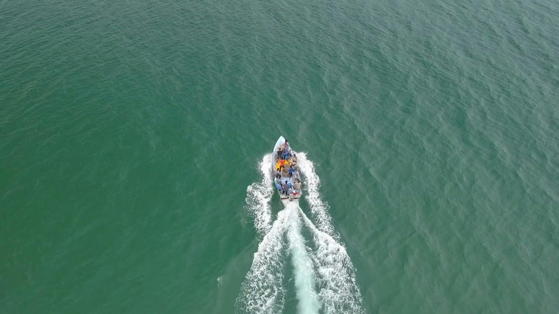Drone Footage of People Traveling while Riding on a Motorboat Free ...