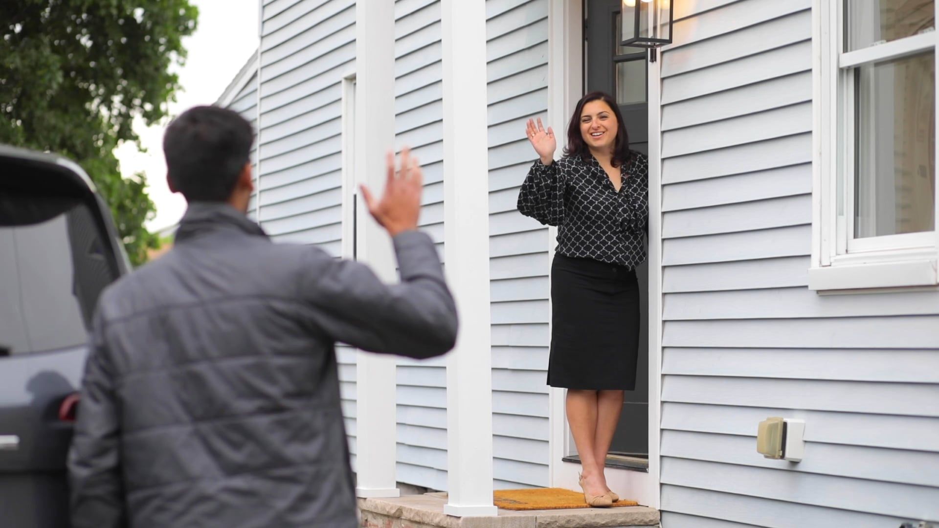 A Man and a Woman Waving Goodbye at Each Other Free Stock Video Footage ...