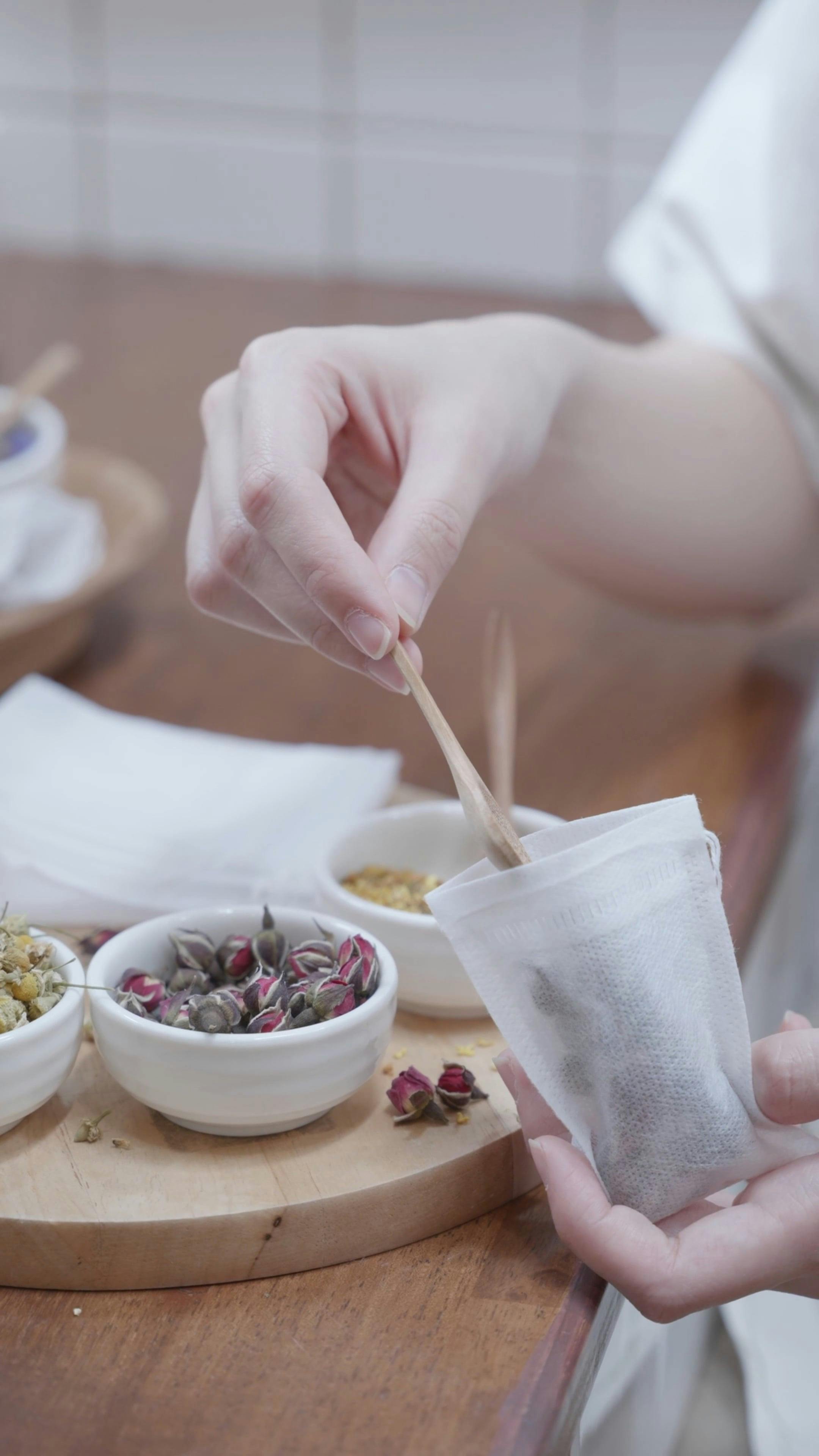 A Woman Preparing a Tea Bag · Free Stock Video