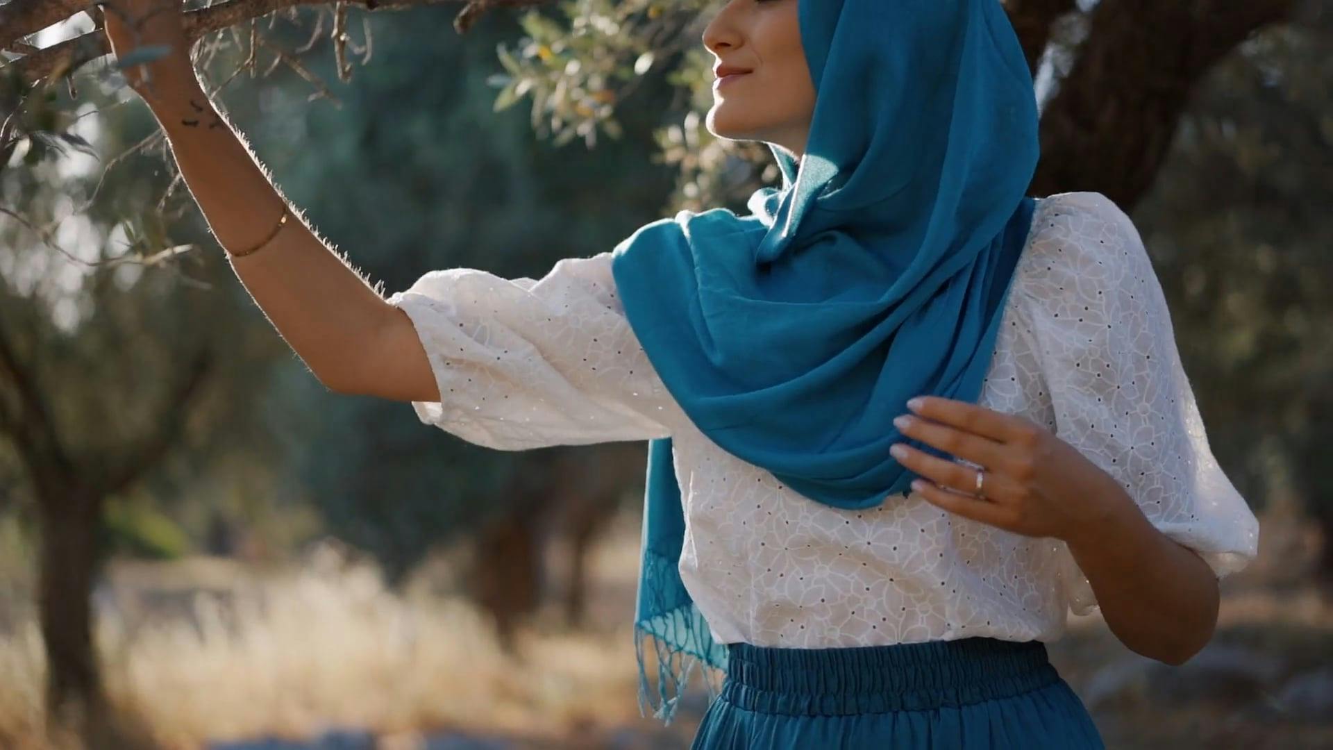 A Woman Smelling the Leaves and Walking in the Forest · Free Stock Video