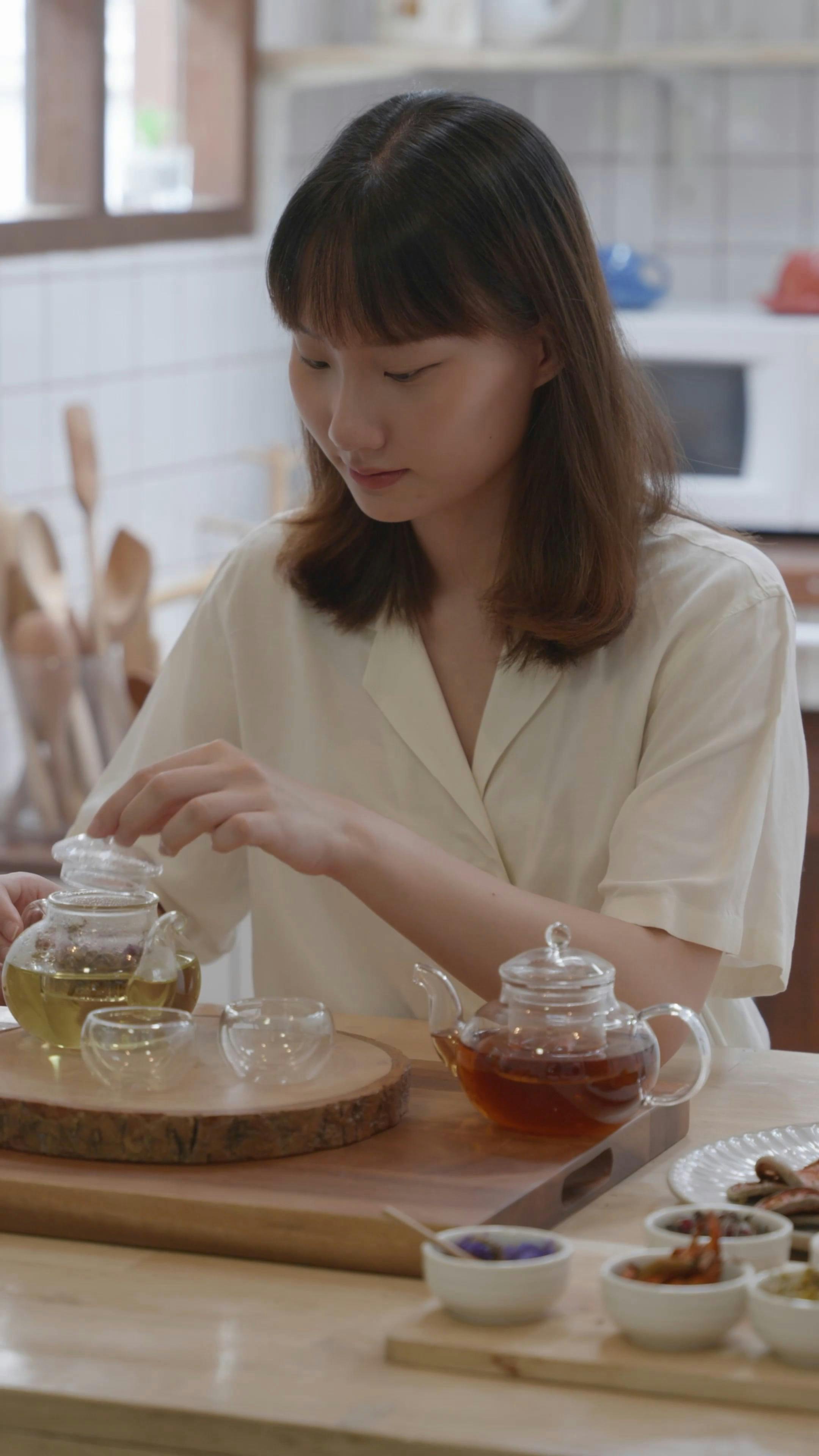 A Woman Smelling a Tea on a Pot Free Stock Video Footage, Royalty-Free ...
