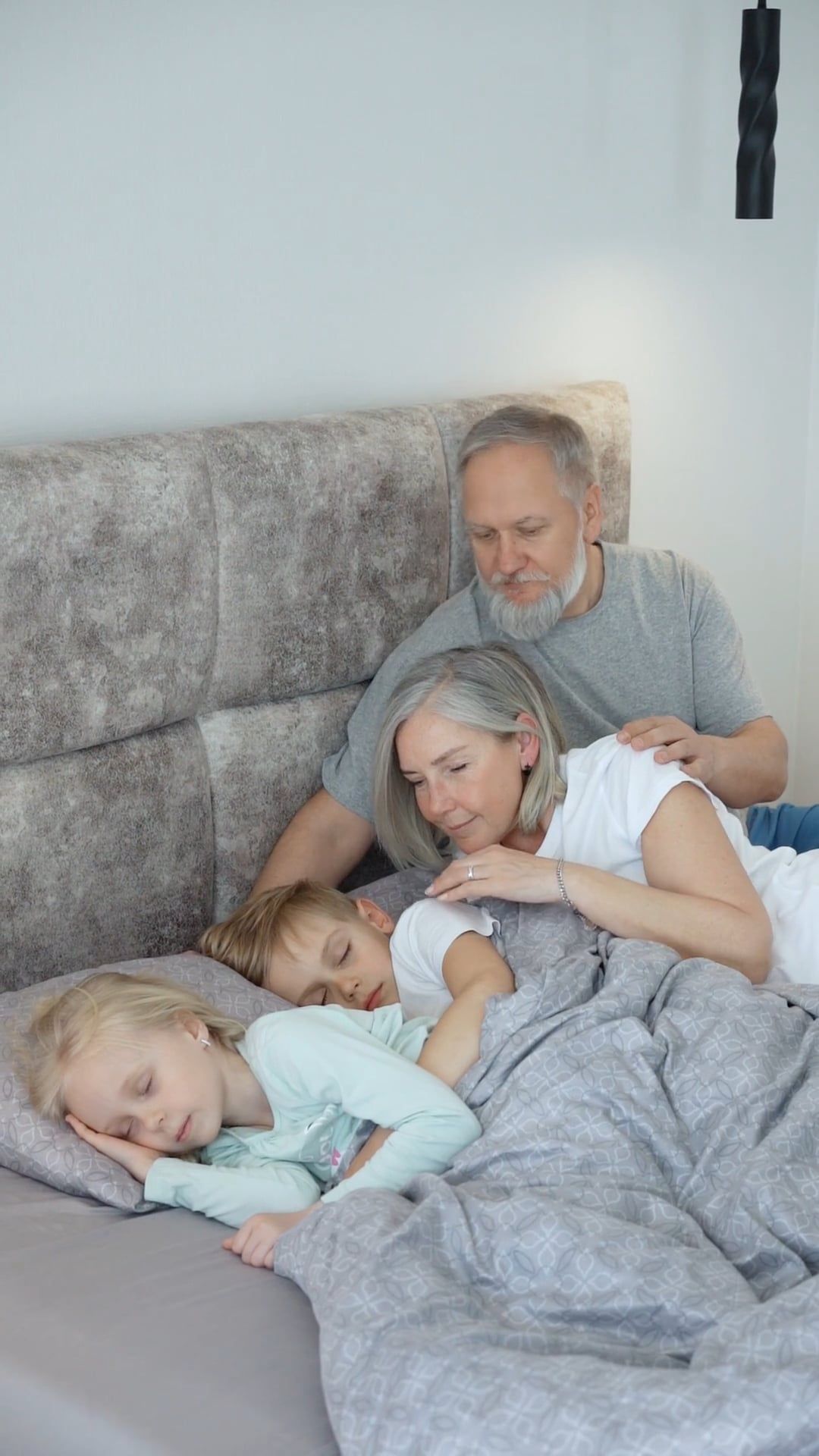 Children Sleeping on the Bed with Grandparents Free Stock Video Footage ...