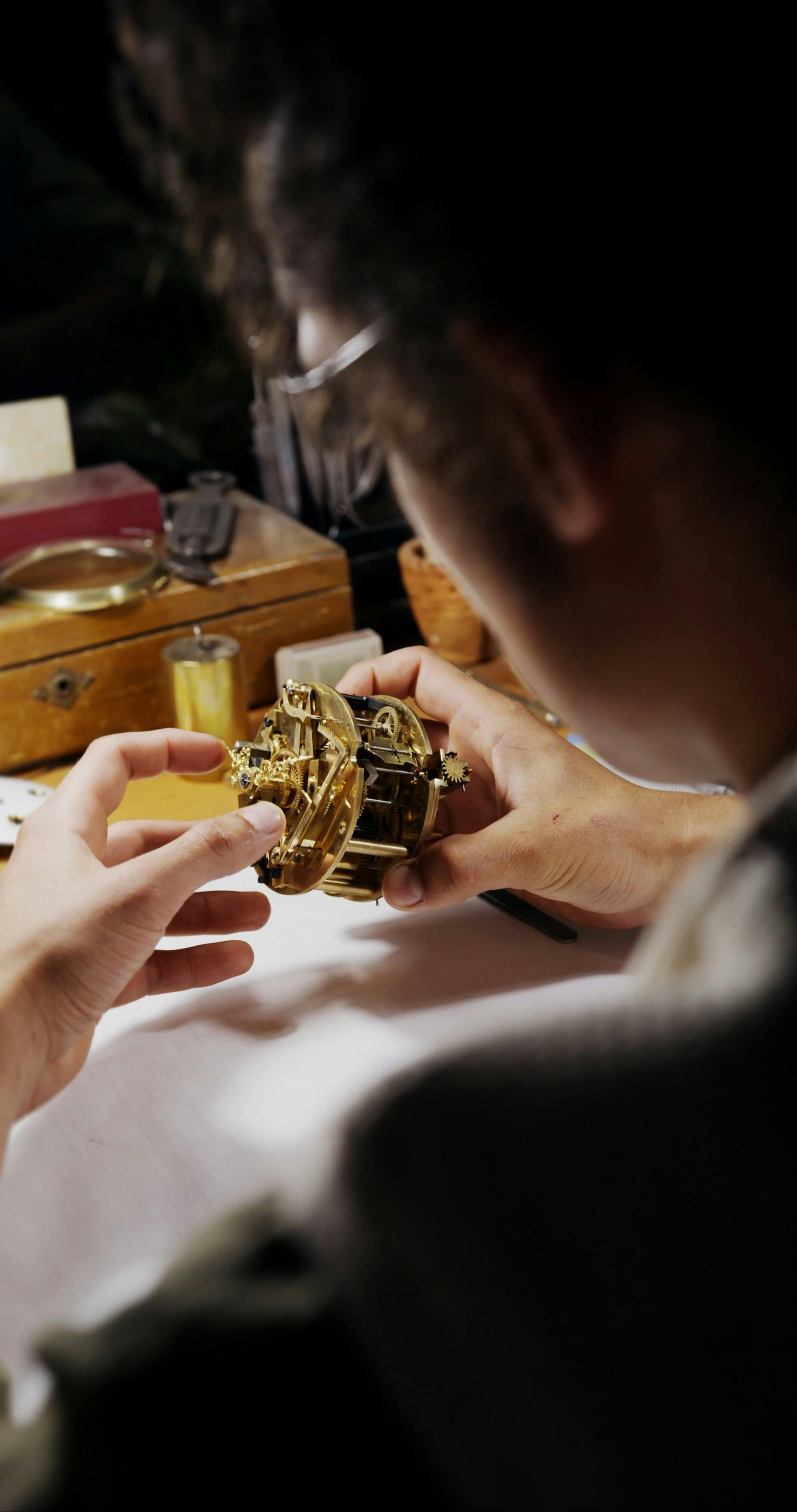 A Man Winding Up an Old Clock Free Stock Video Footage, Royalty-Free 4K ...