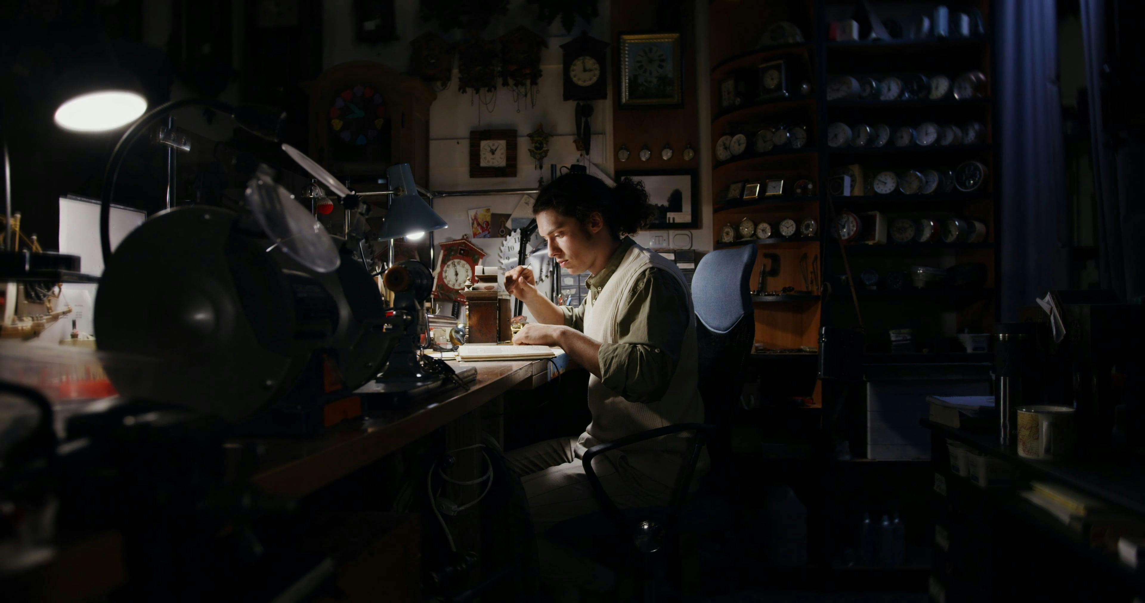 Young Man Repairing a Clock · Free Stock Video