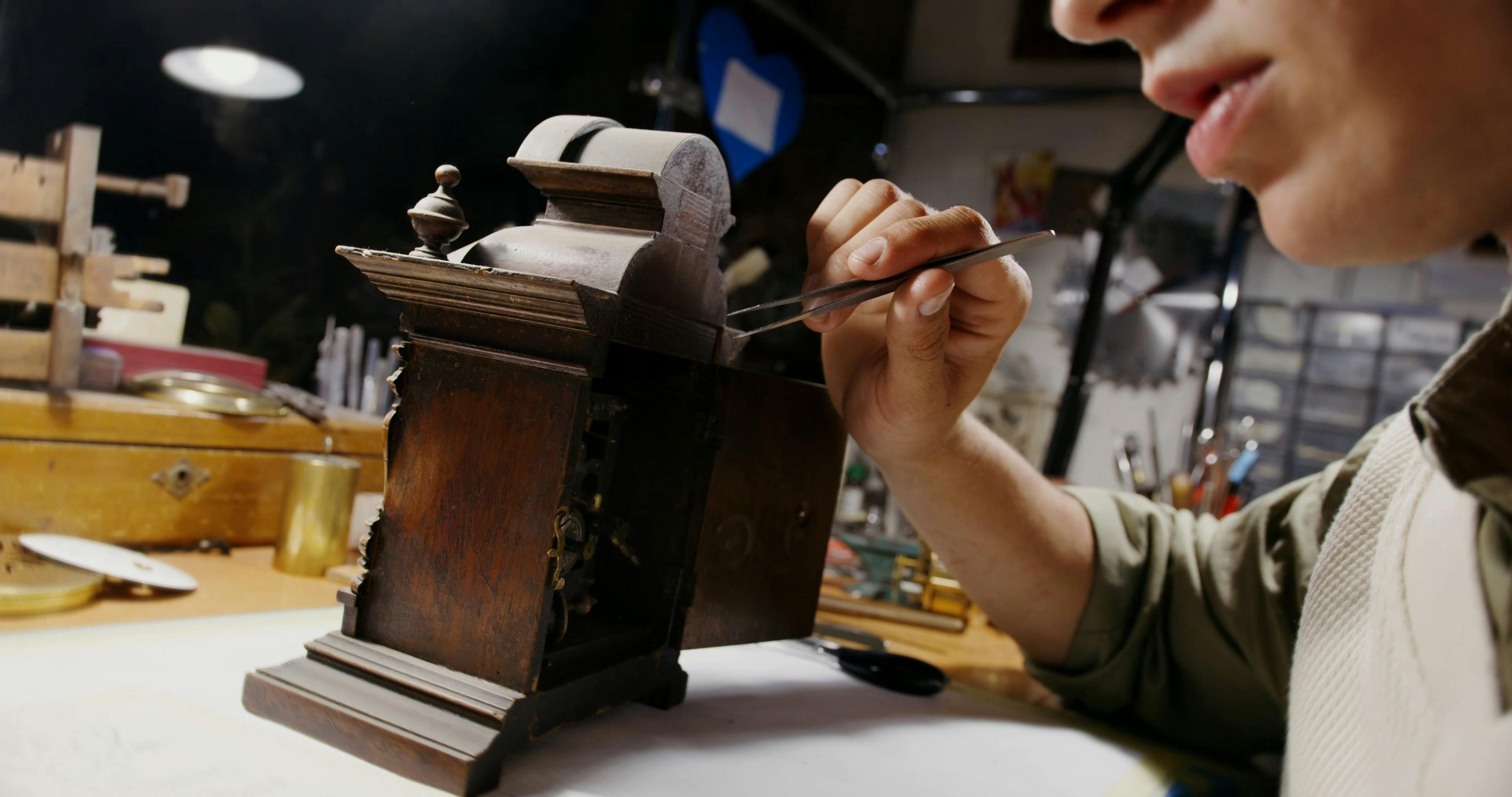 A Man Repairing a Vintage Clock Free Stock Video Footage, Royalty-Free ...