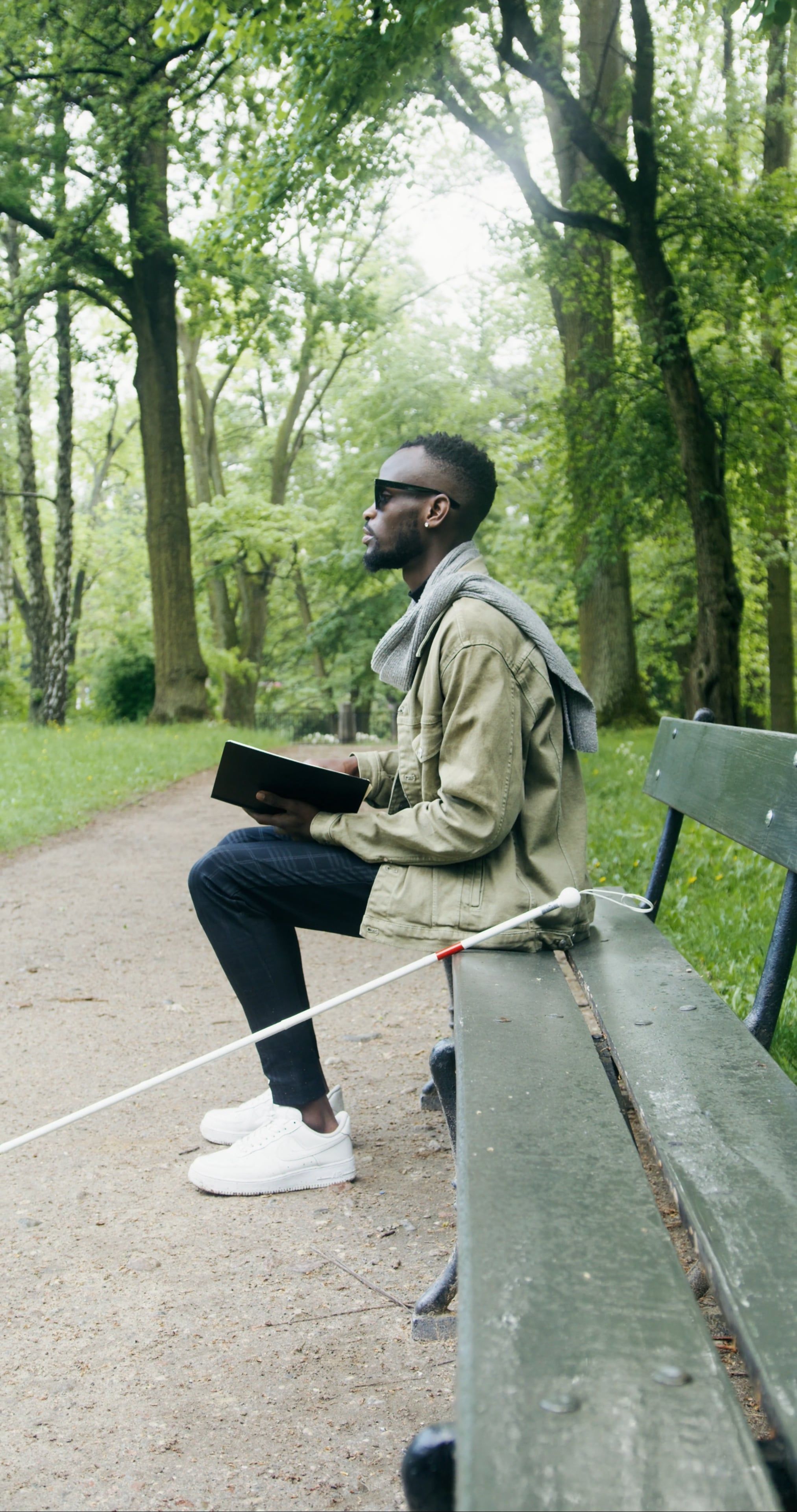 Man Reading a Book Outdoors · Free Stock Video