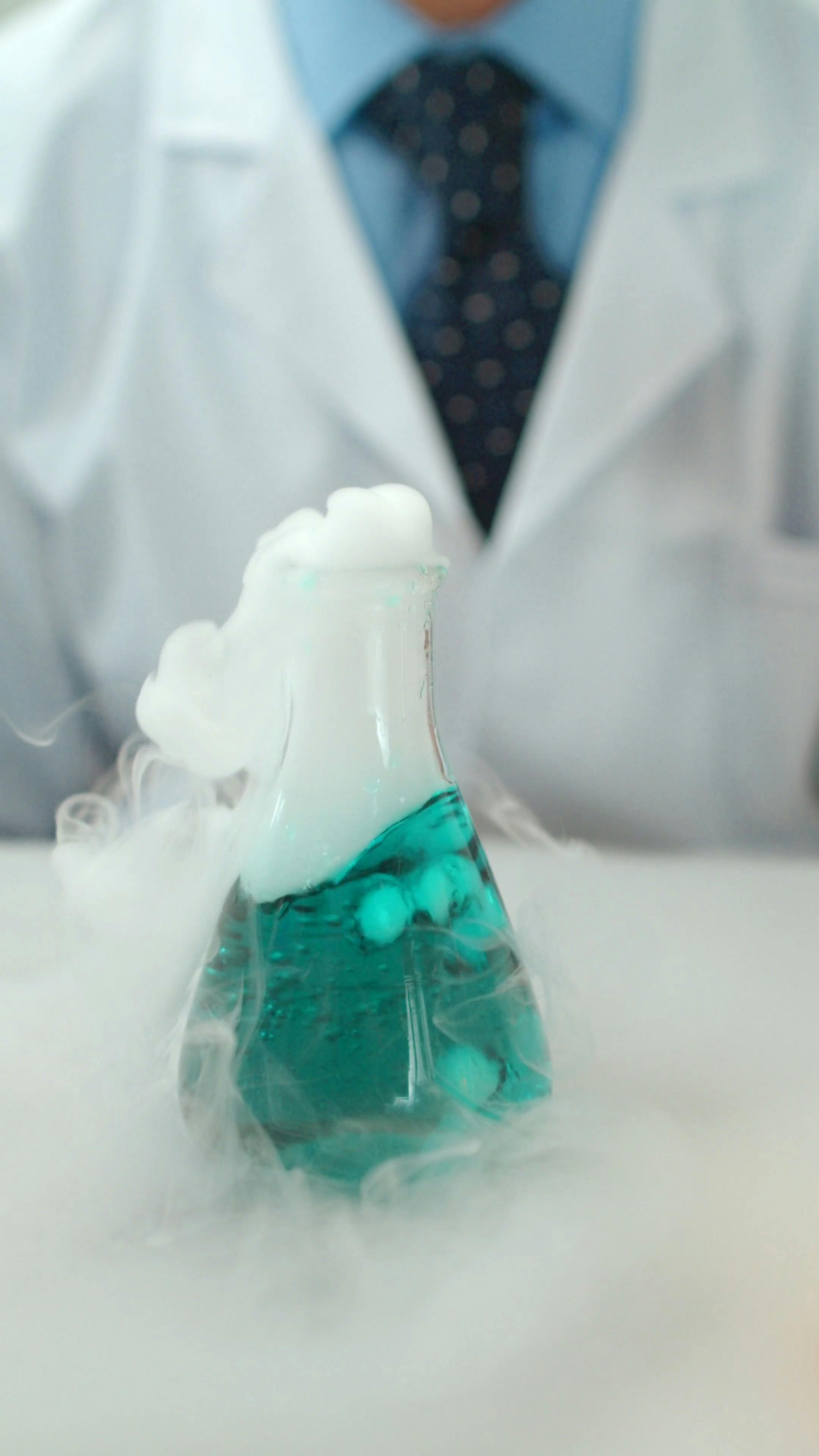 A Scientist Watching The Sublimation Of Matter · Free Stock Video