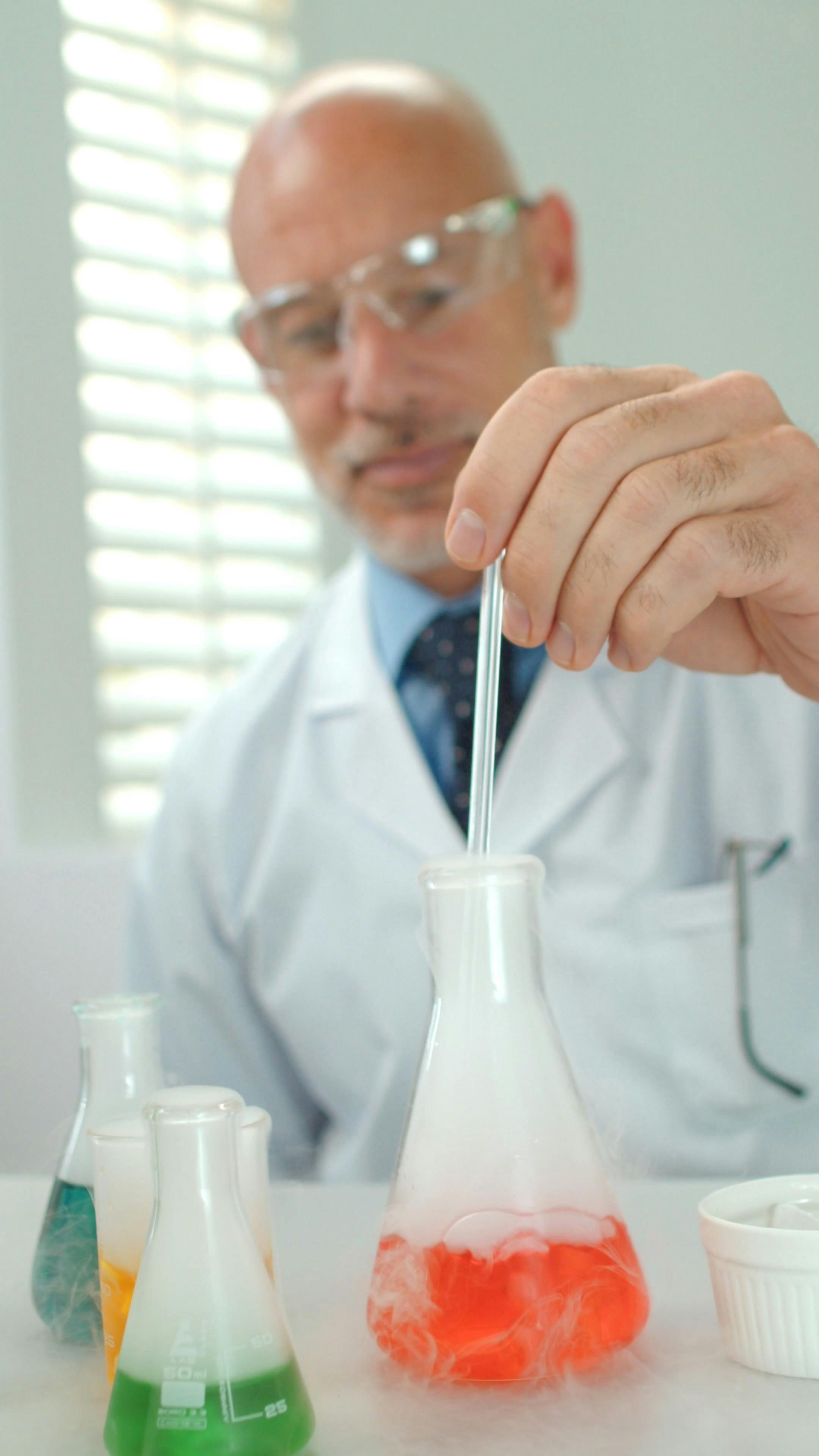 A Scientist Doing An Experiment In The Laboratory · Free Stock Video
