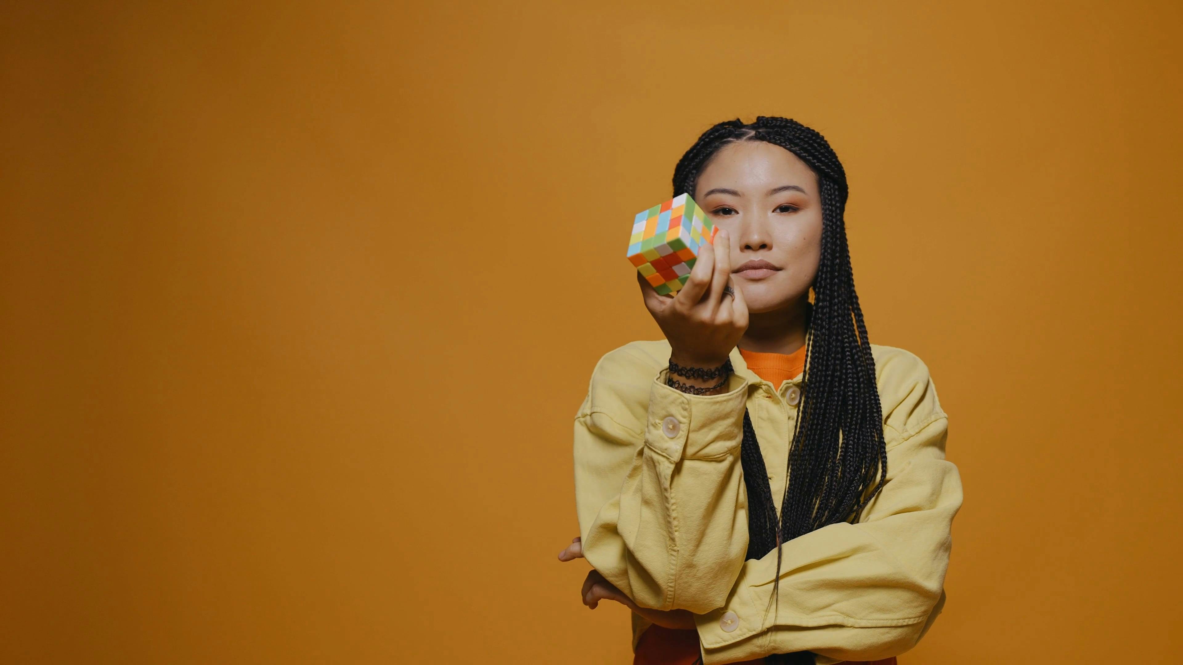 Female Model Throwing a Rubik's Cube Free Stock Video Footage, Royalty ...