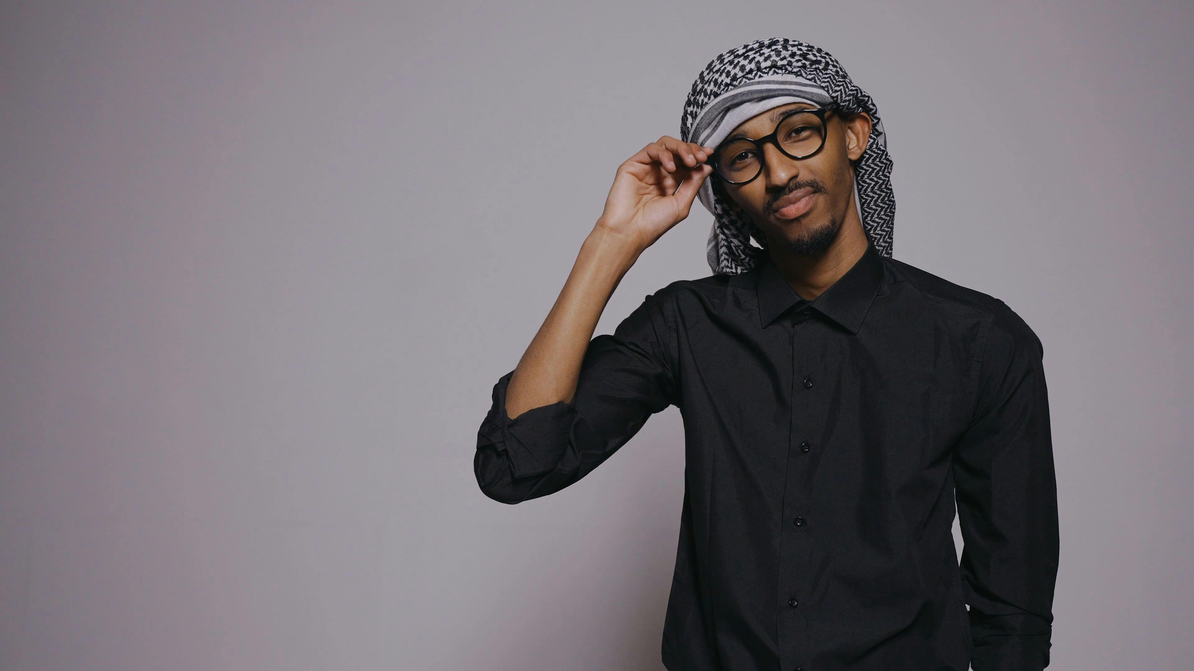 Man Wearing Turban While Poses On Camera · Free Stock Video