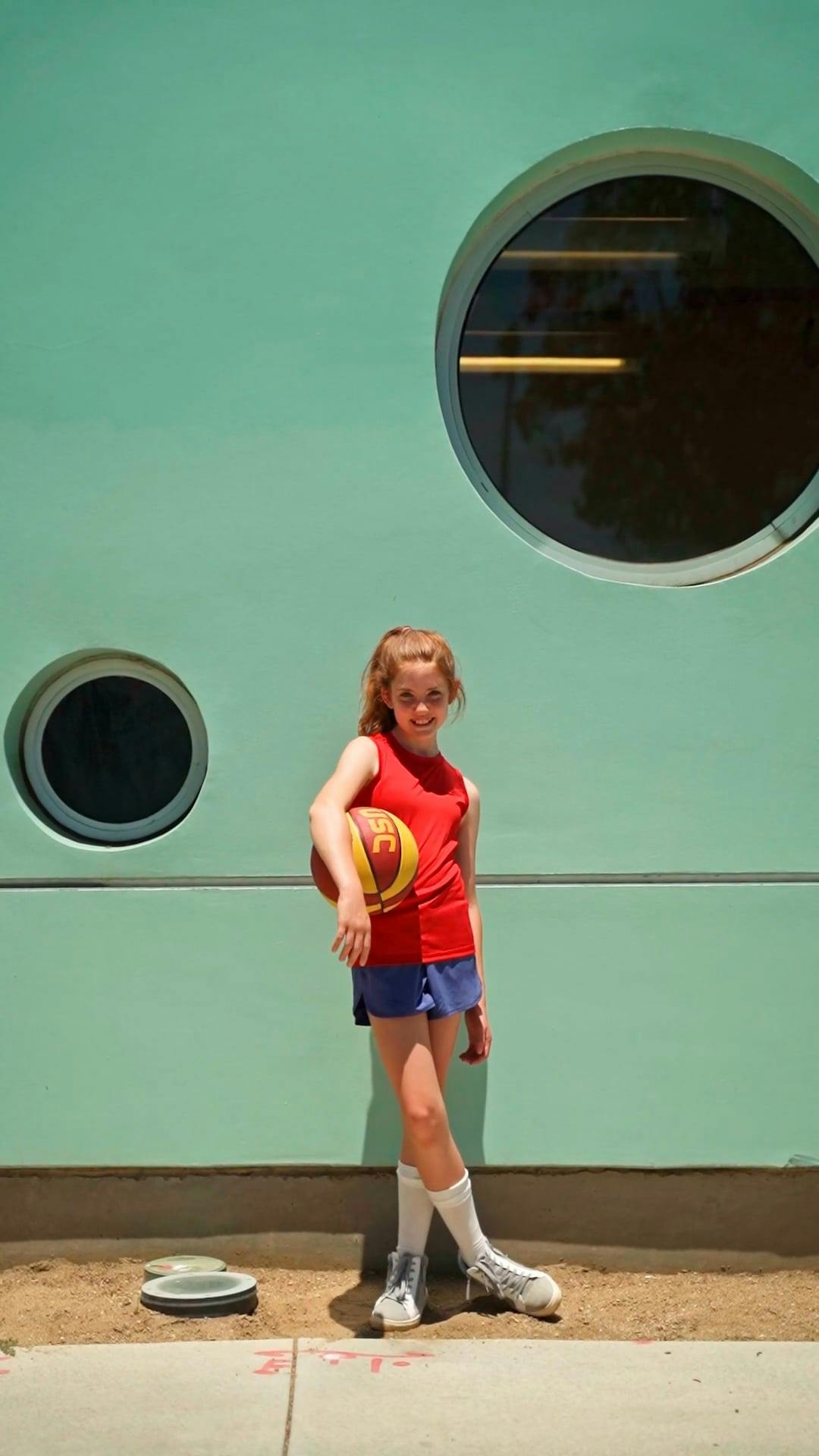 A Girl Carrying a Ball · Free Stock Video