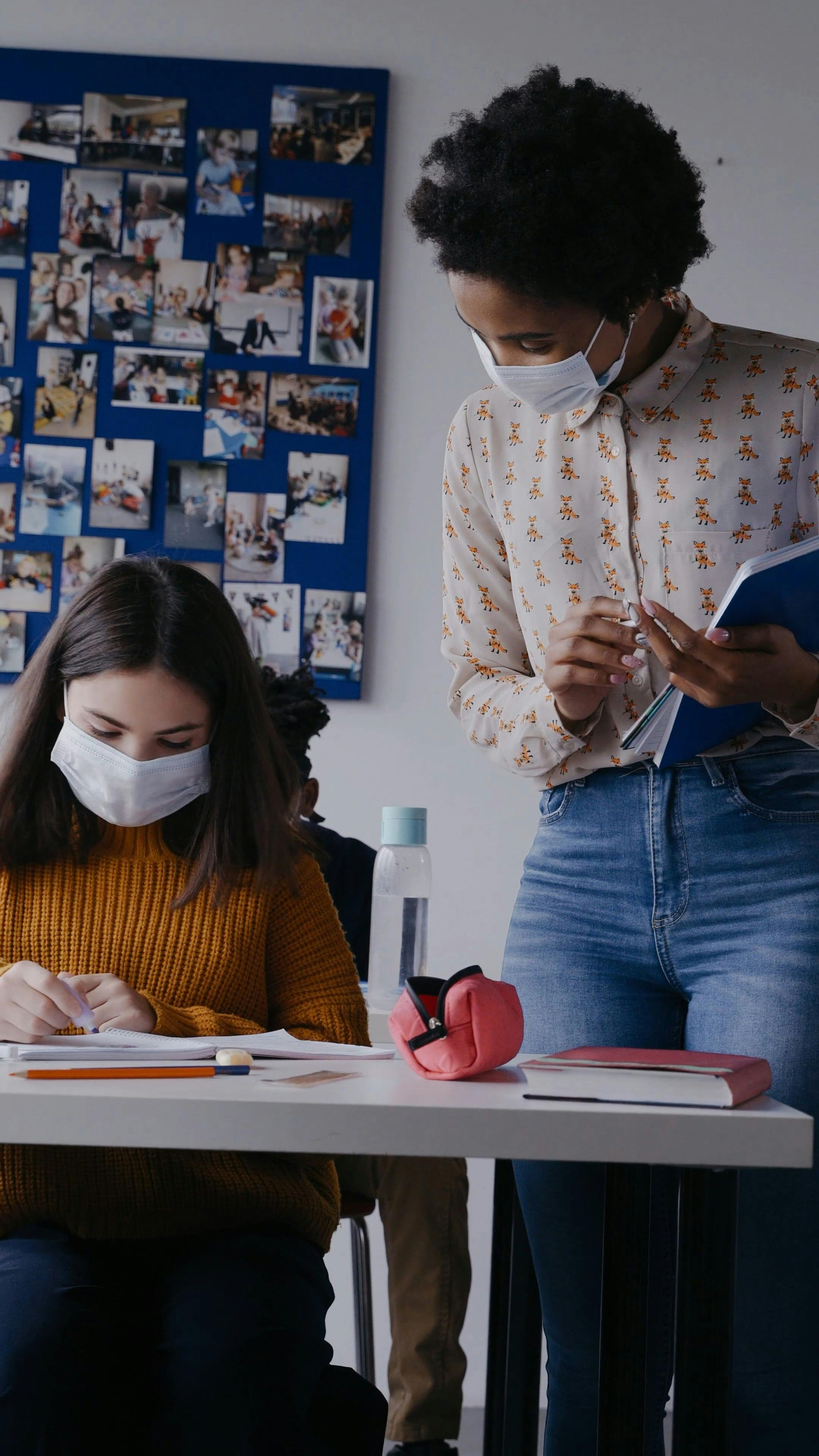 A Teacher Guiding a Student · Free Stock Video