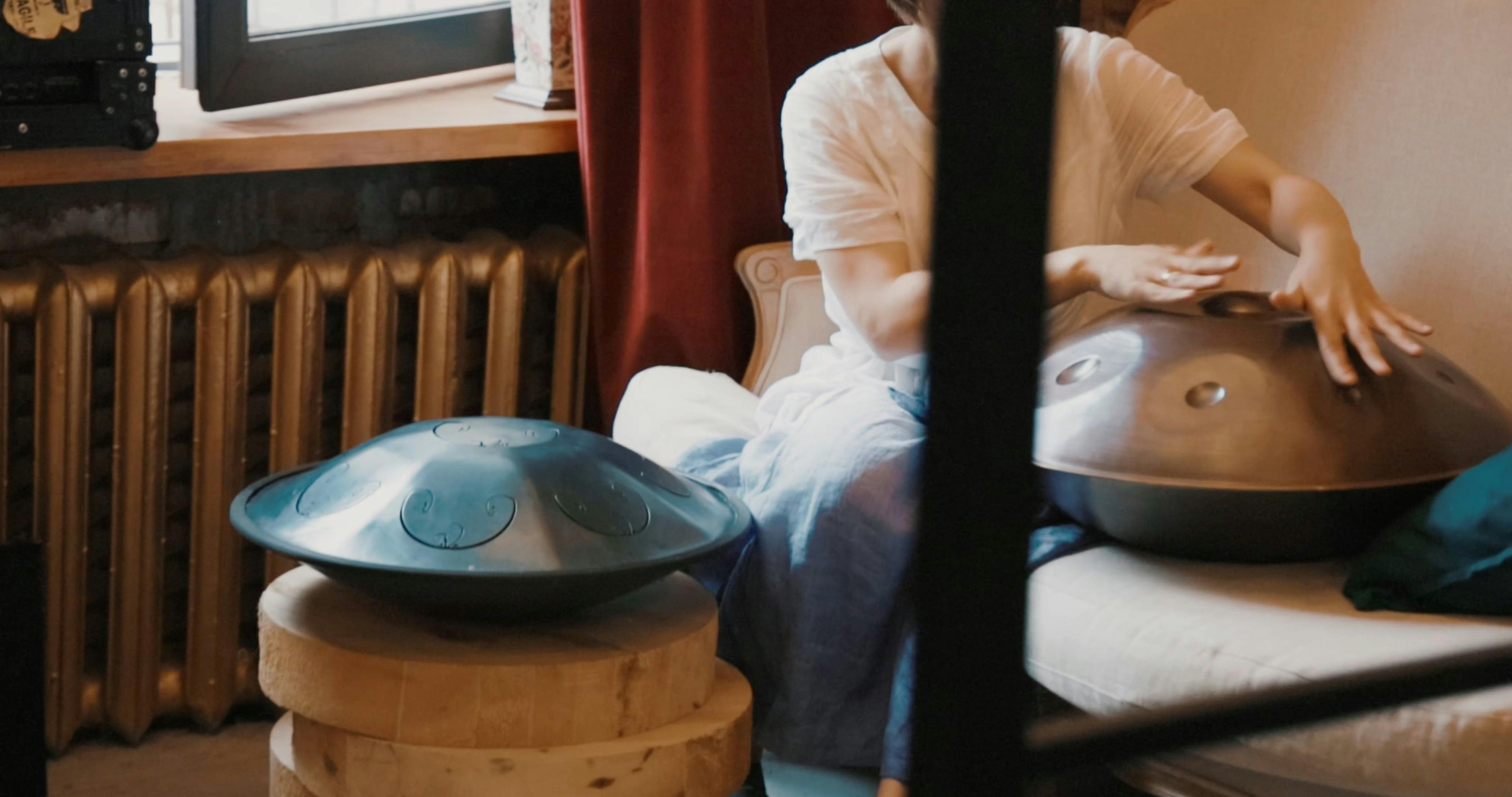 A Woman using a Handpan Free Stock Video Footage, Royalty-Free 4K & HD ...