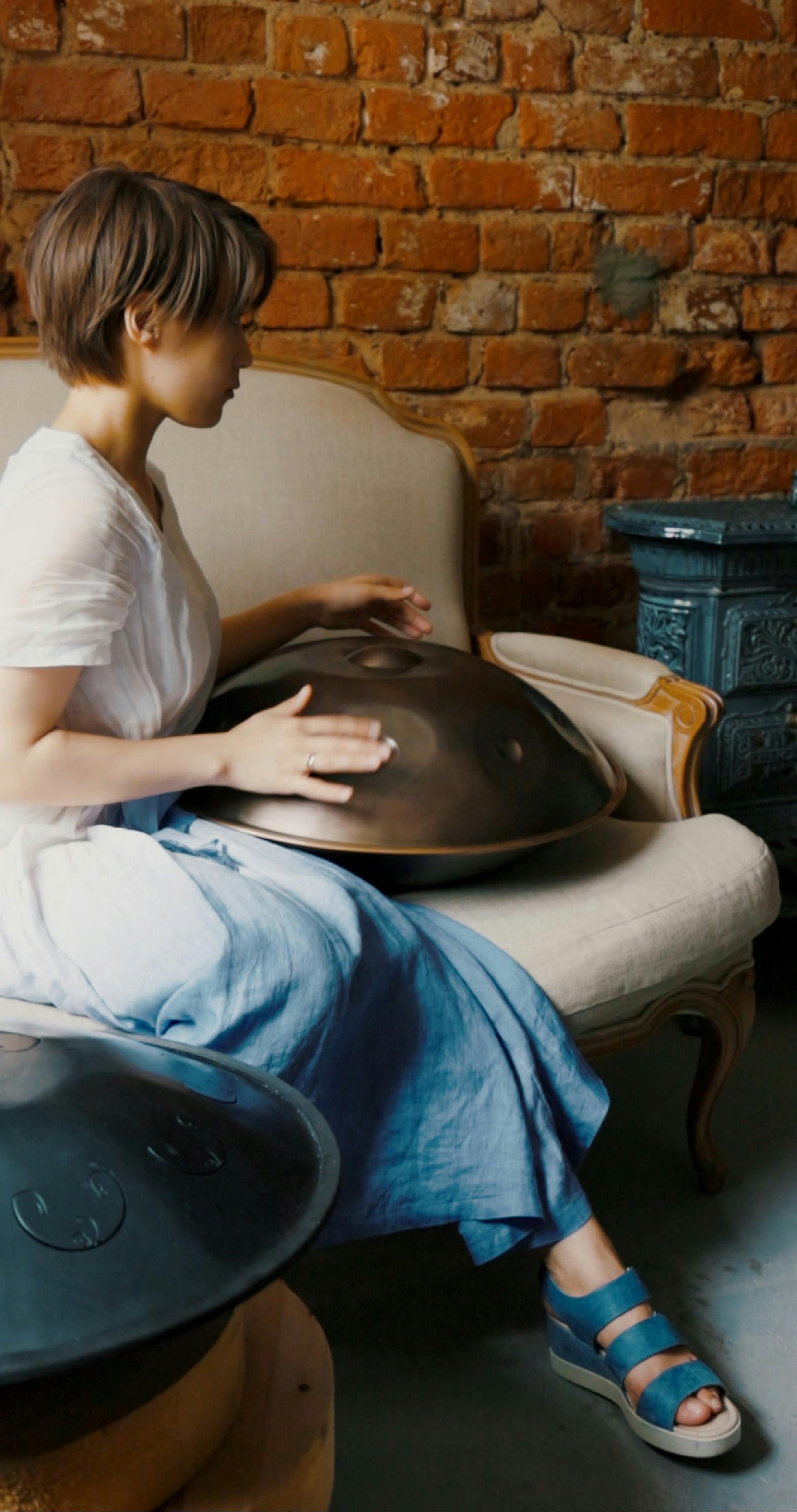 A Woman Playing the Handpan Free Stock Video Footage, Royalty-Free 4K ...