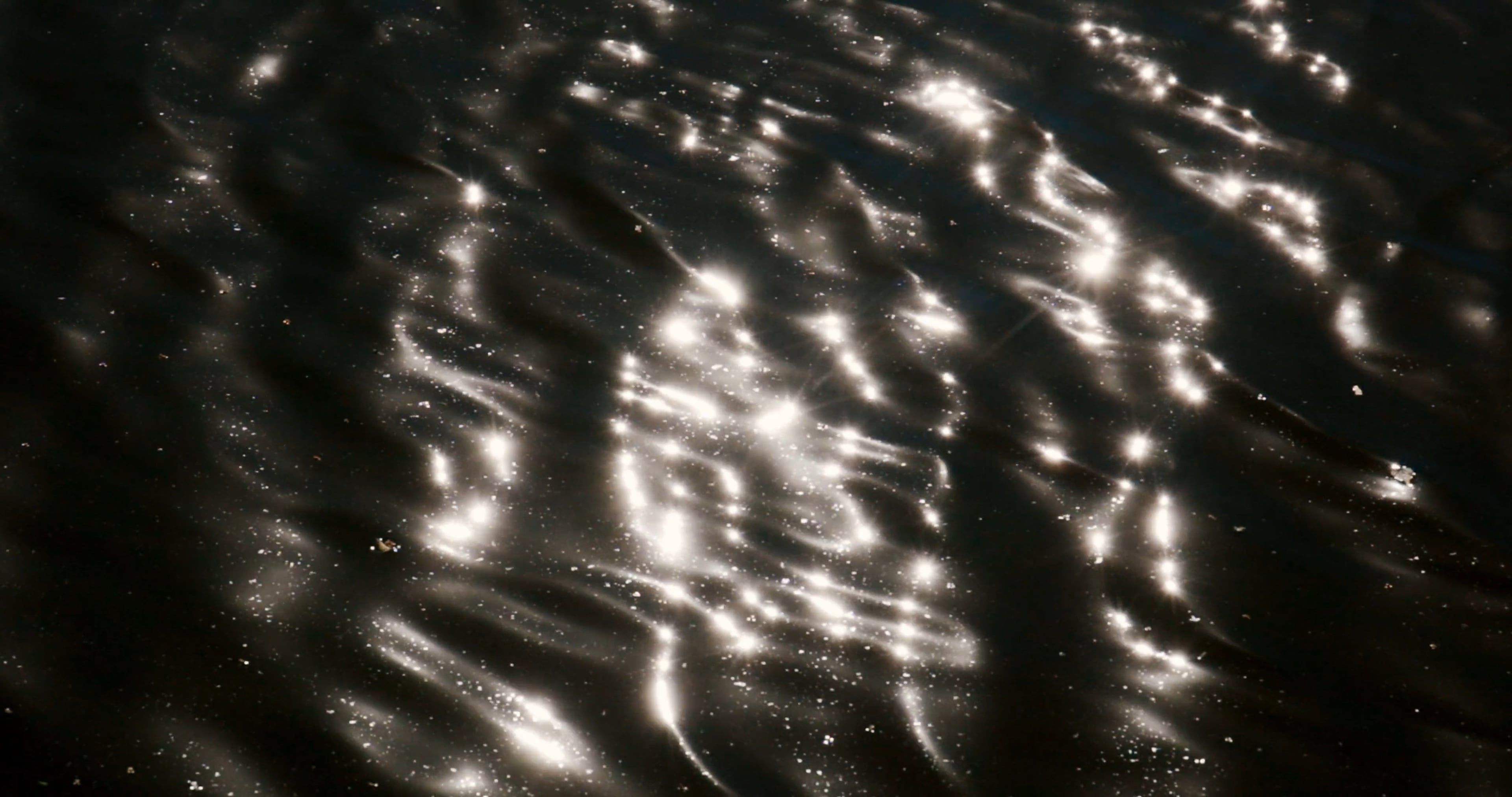 Reflections of Lights on a Water · Free Stock Video