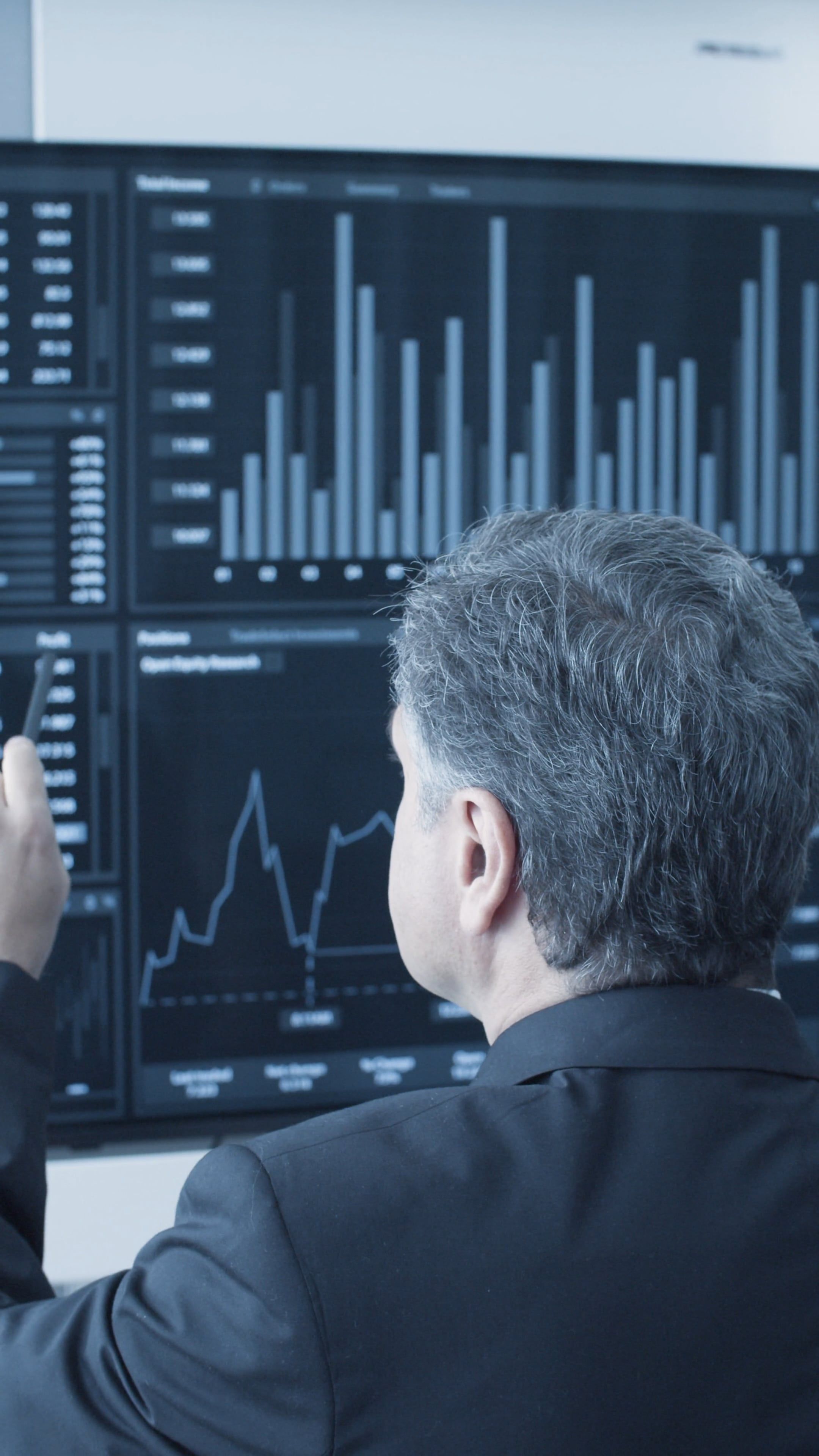 Businessman Pointing at a Screen · Free Stock Video