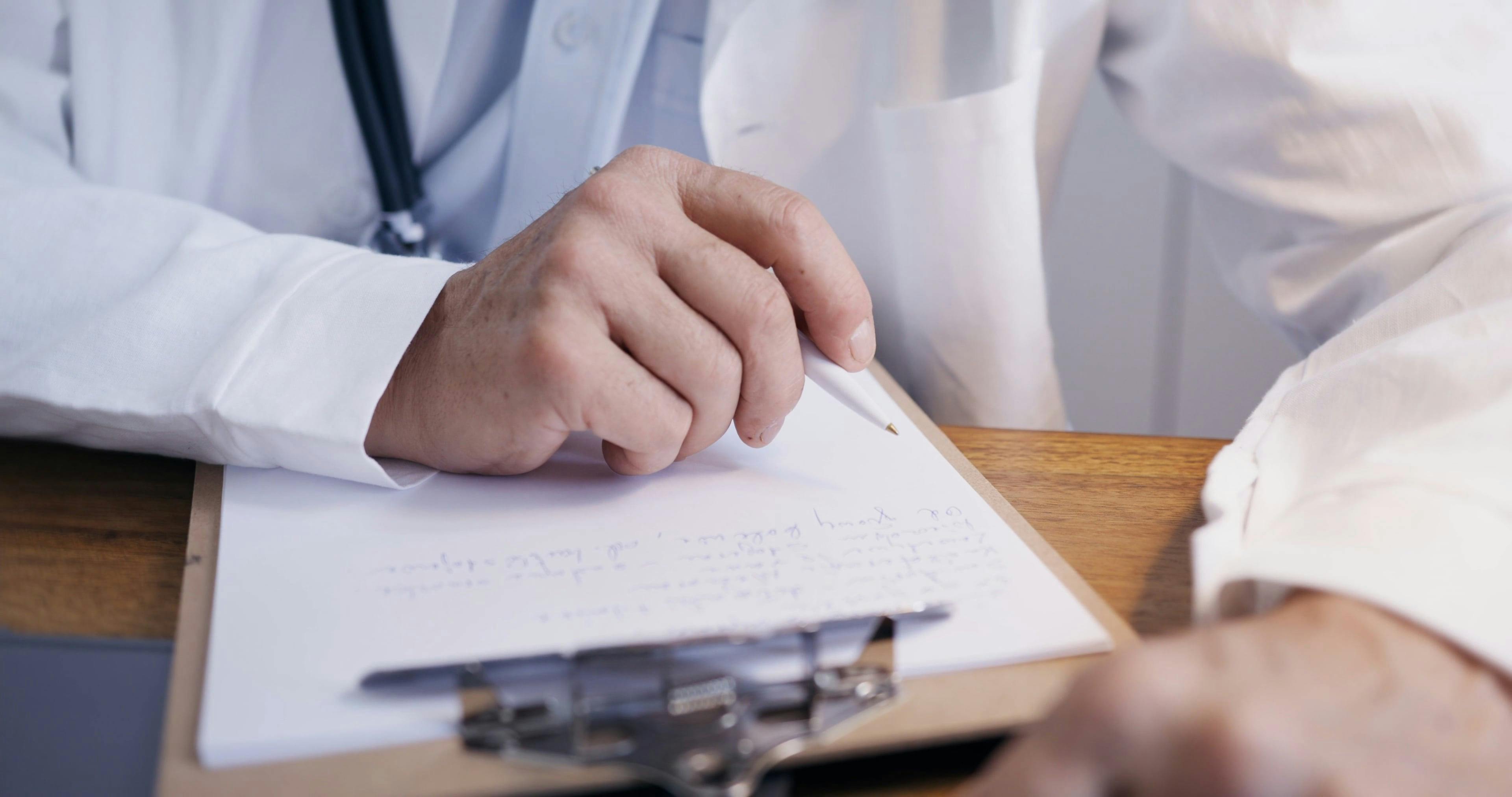Close Up Shot of Person Writing on the Paper · Free Stock Video