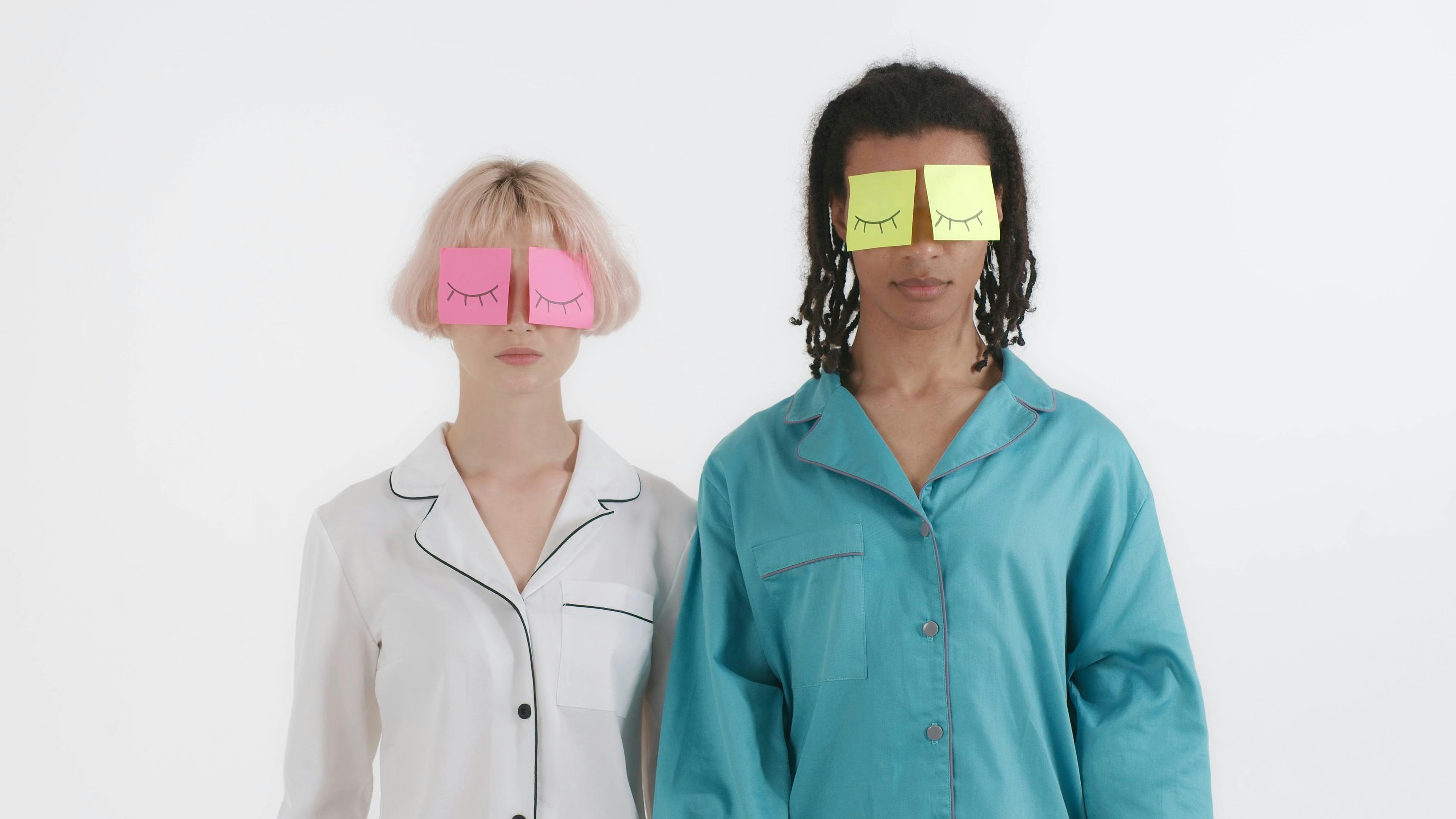 A Man and a Woman With Sticky Notes Covering their Eyes Free Stock ...