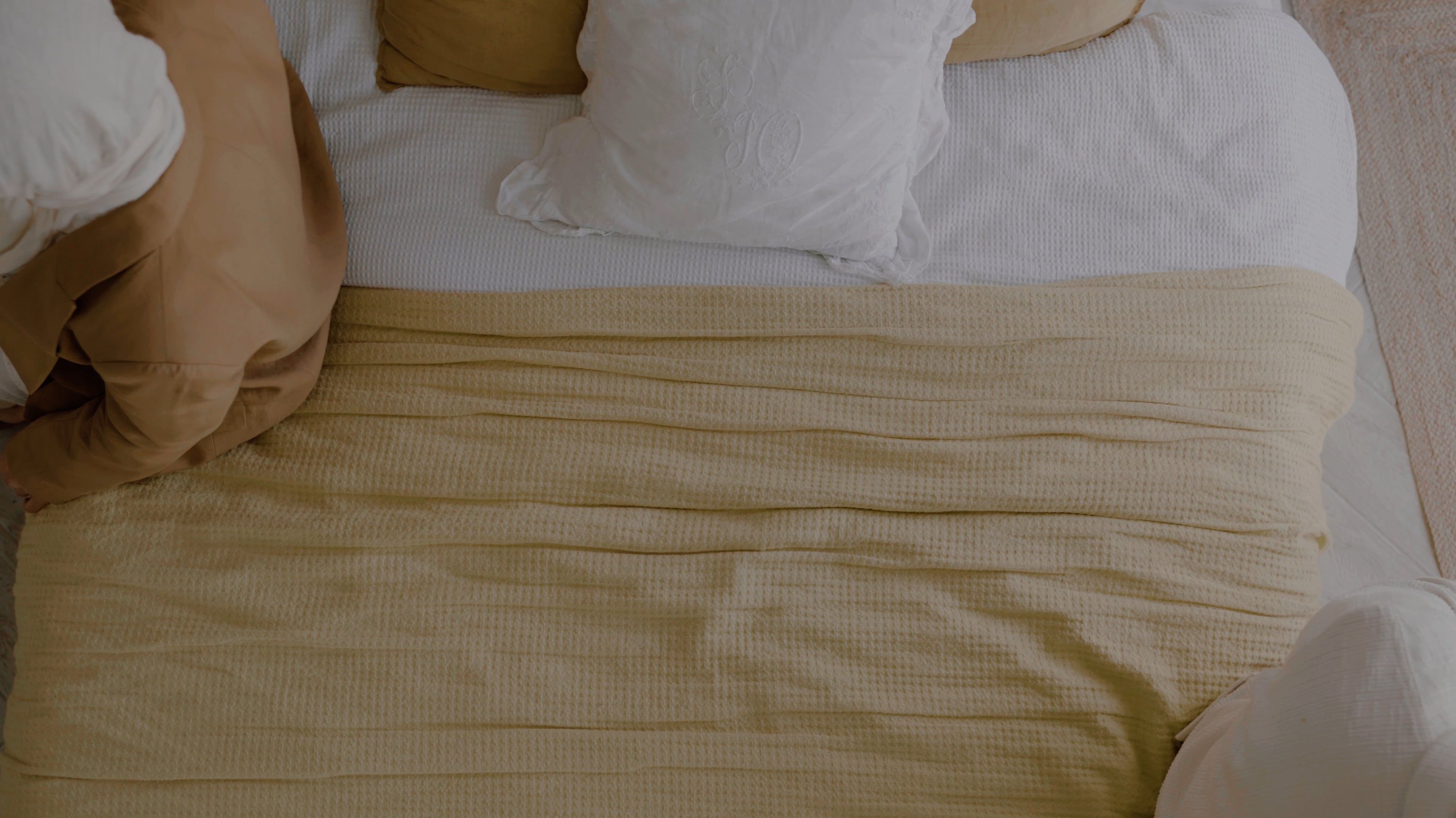 A Couple Lying Down on the Bed and Looking at Each Other · Free Stock Video